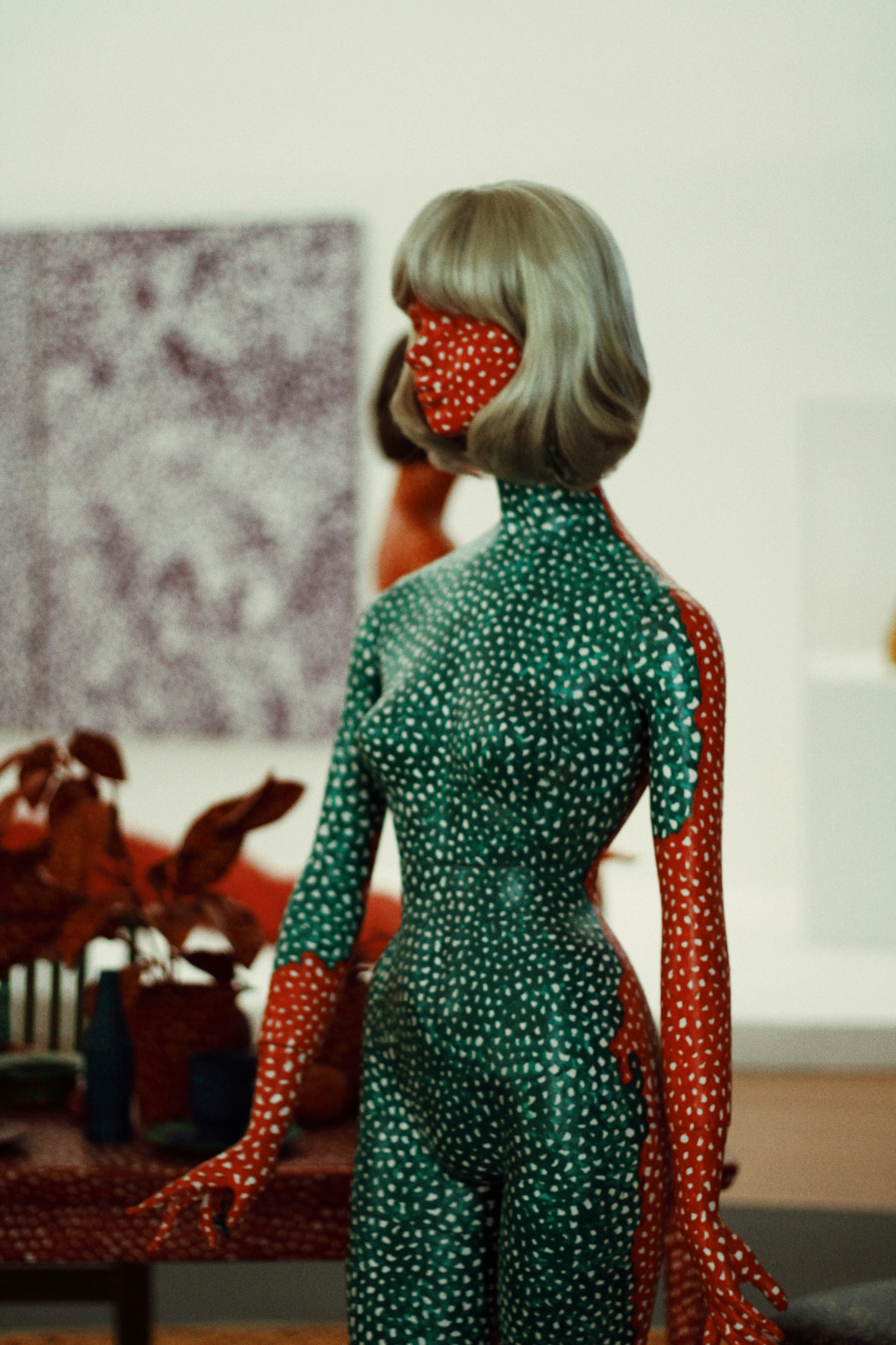 Dual-Toned Dots: A Surreal Mannequin in a Quiet Gallery