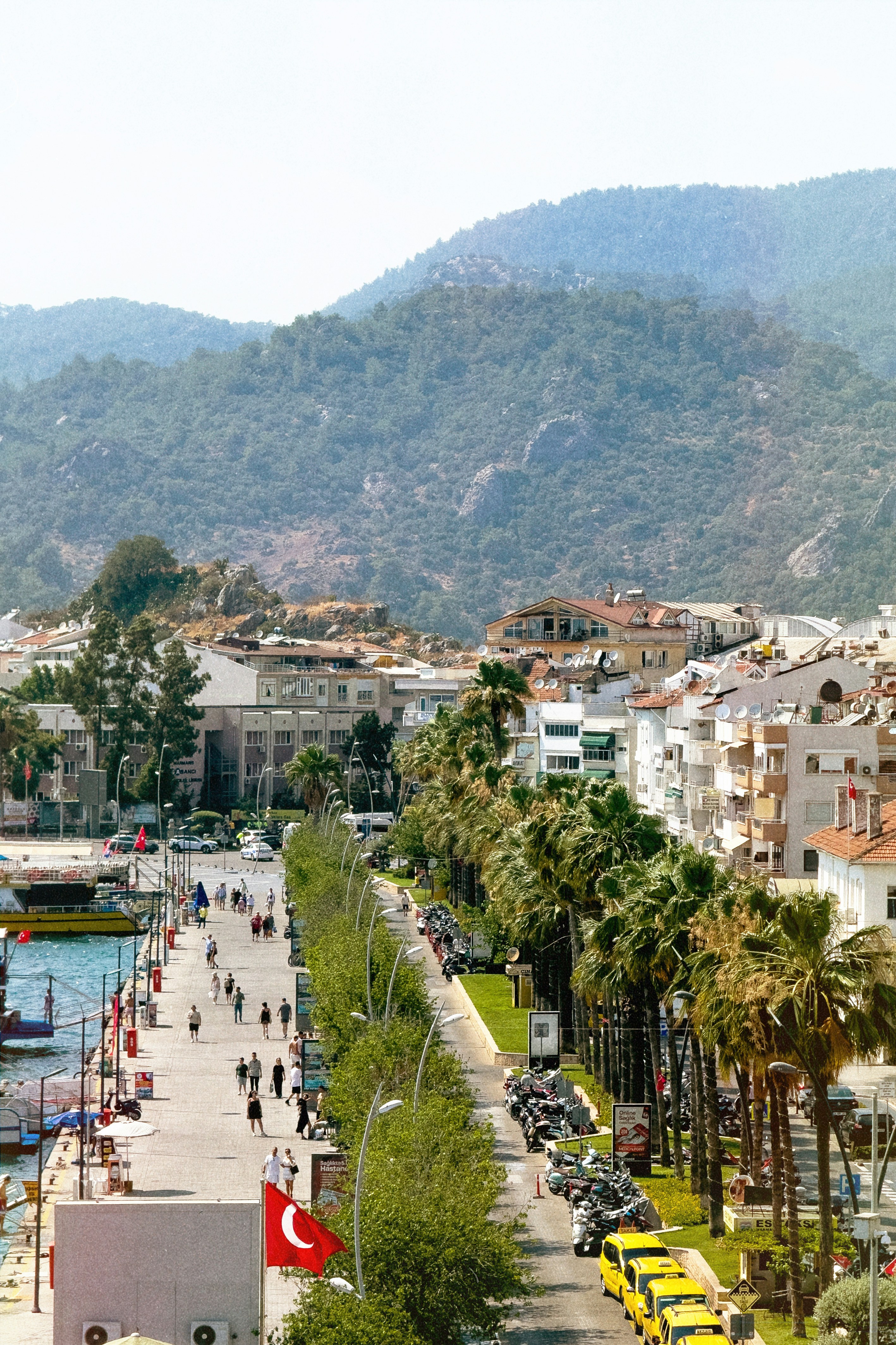 A view of a city with mountains in the background photo – Free Travel ...