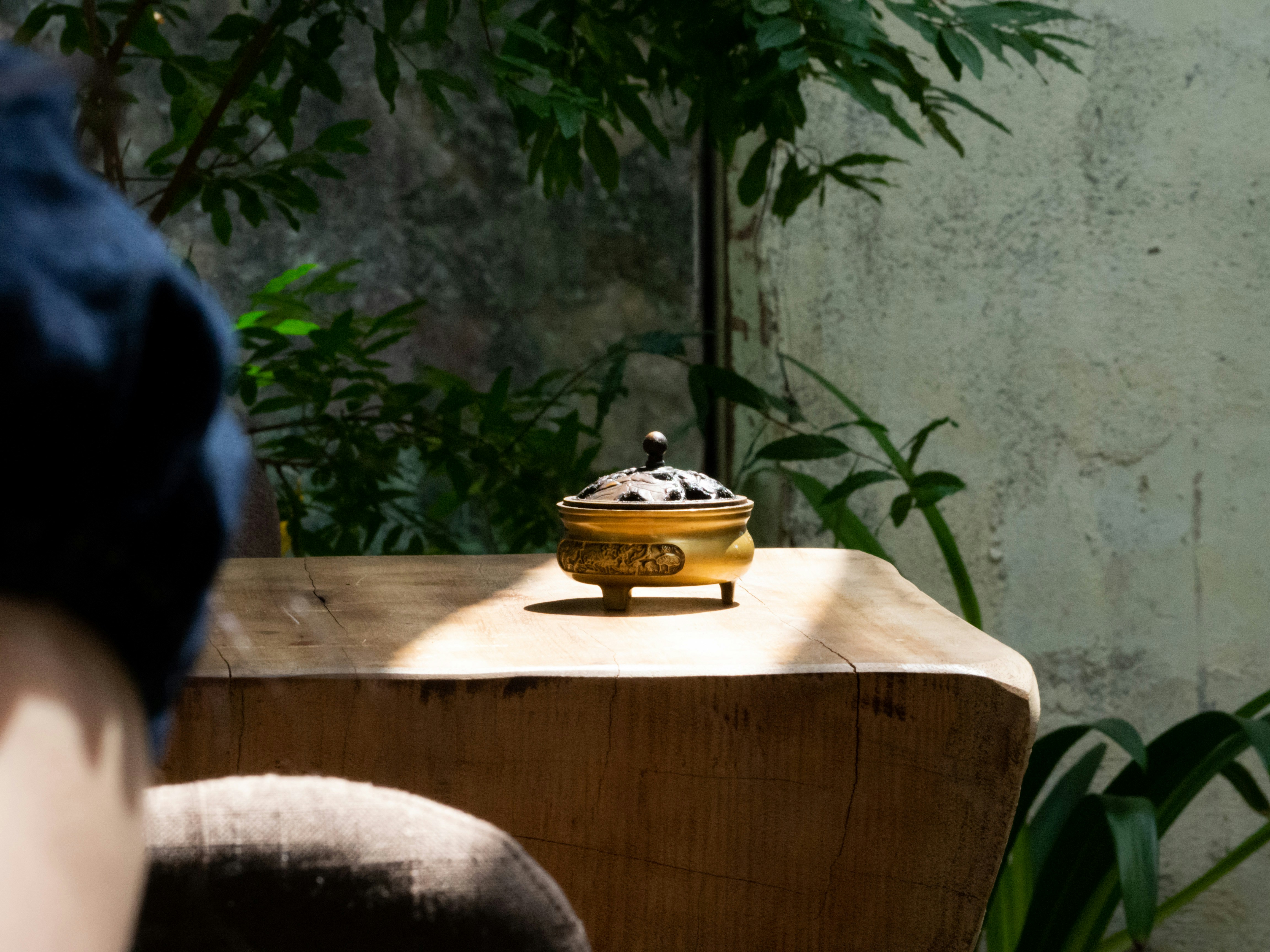 Brass-Lidded Pot in Quiet Afternoon Light on a Weathered Table