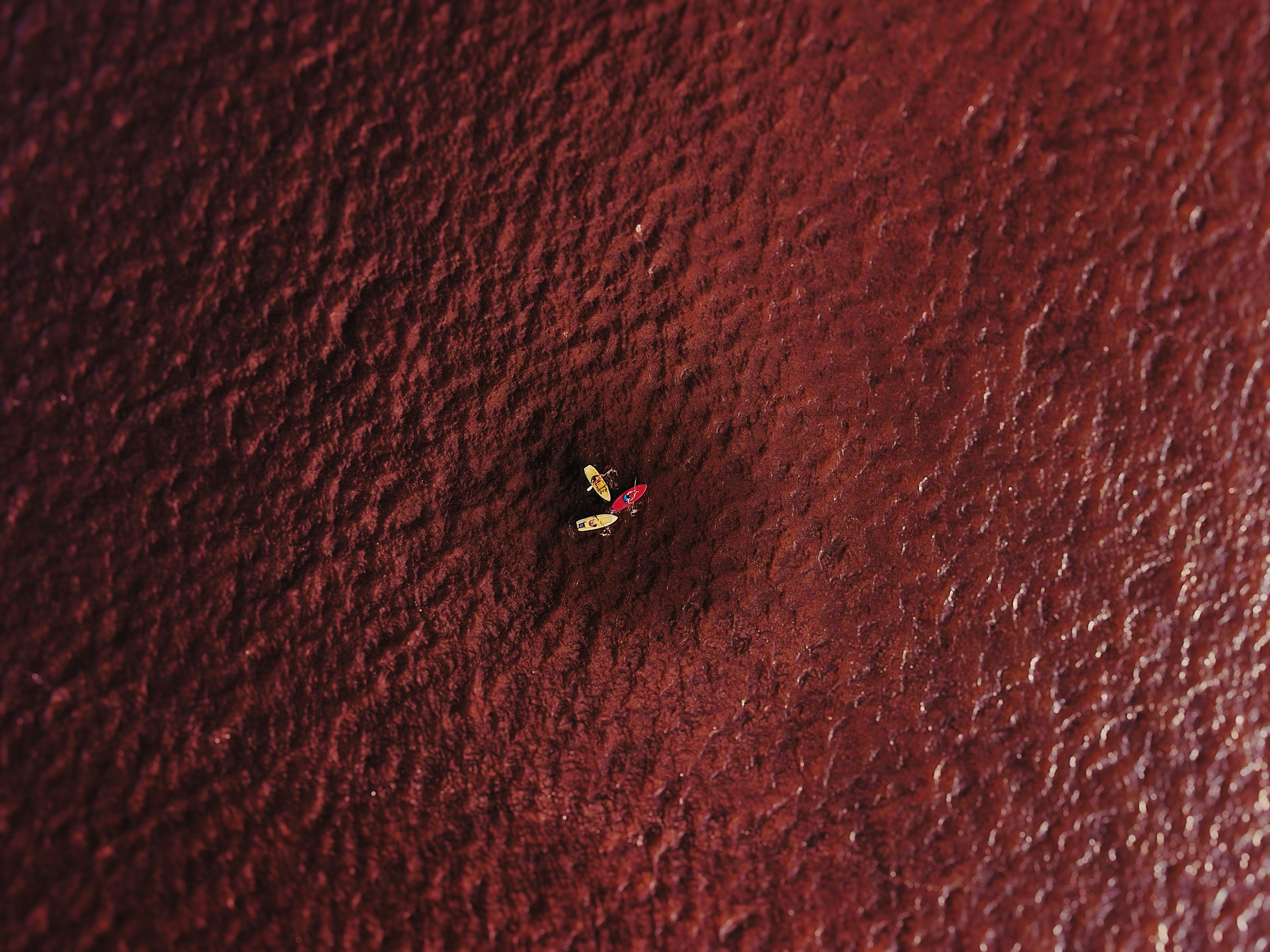 A small white object on a red surface photo – Free Santa maría del oro ...