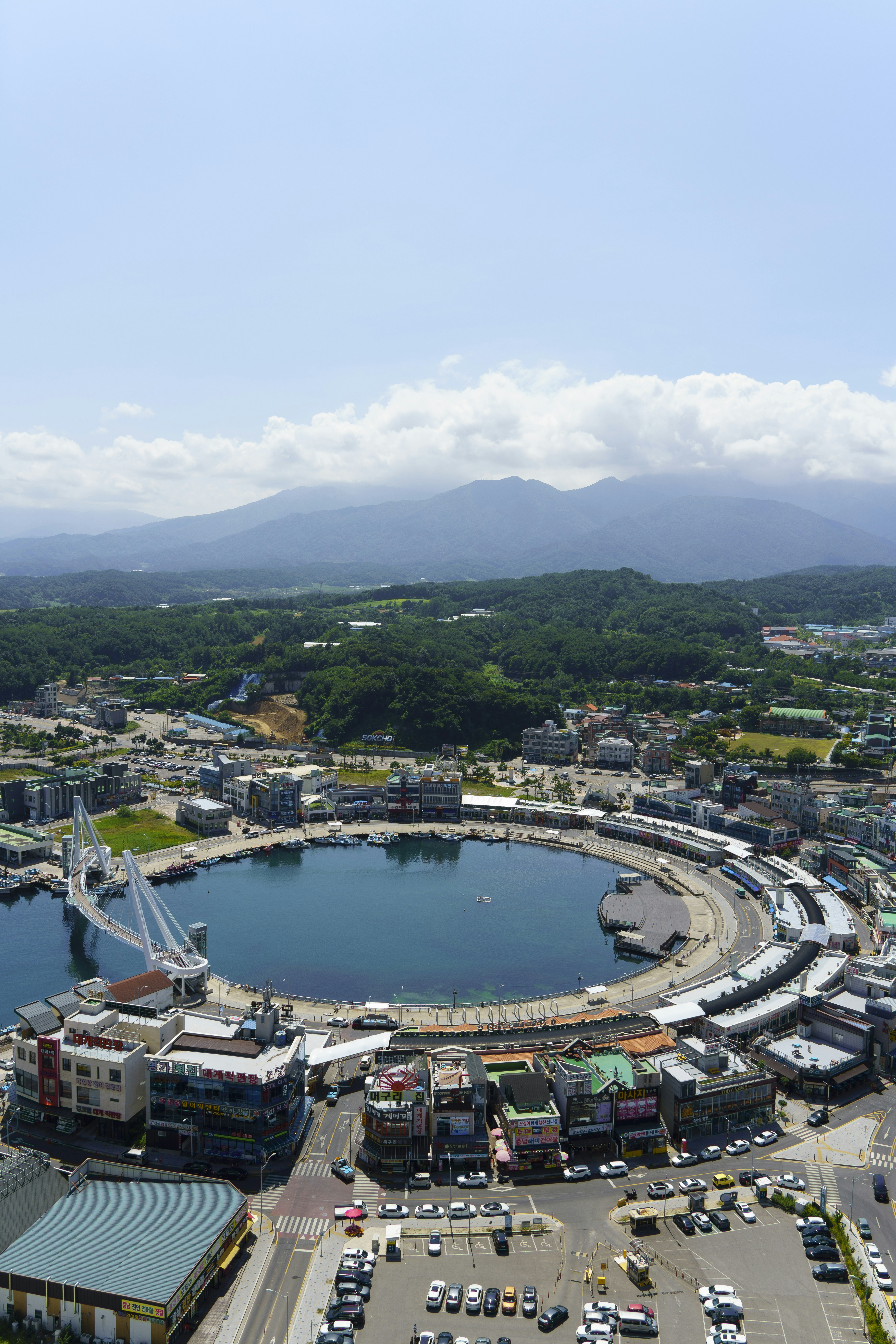 Harbor Ring: A Circular Marina Encircling a Coastal Town