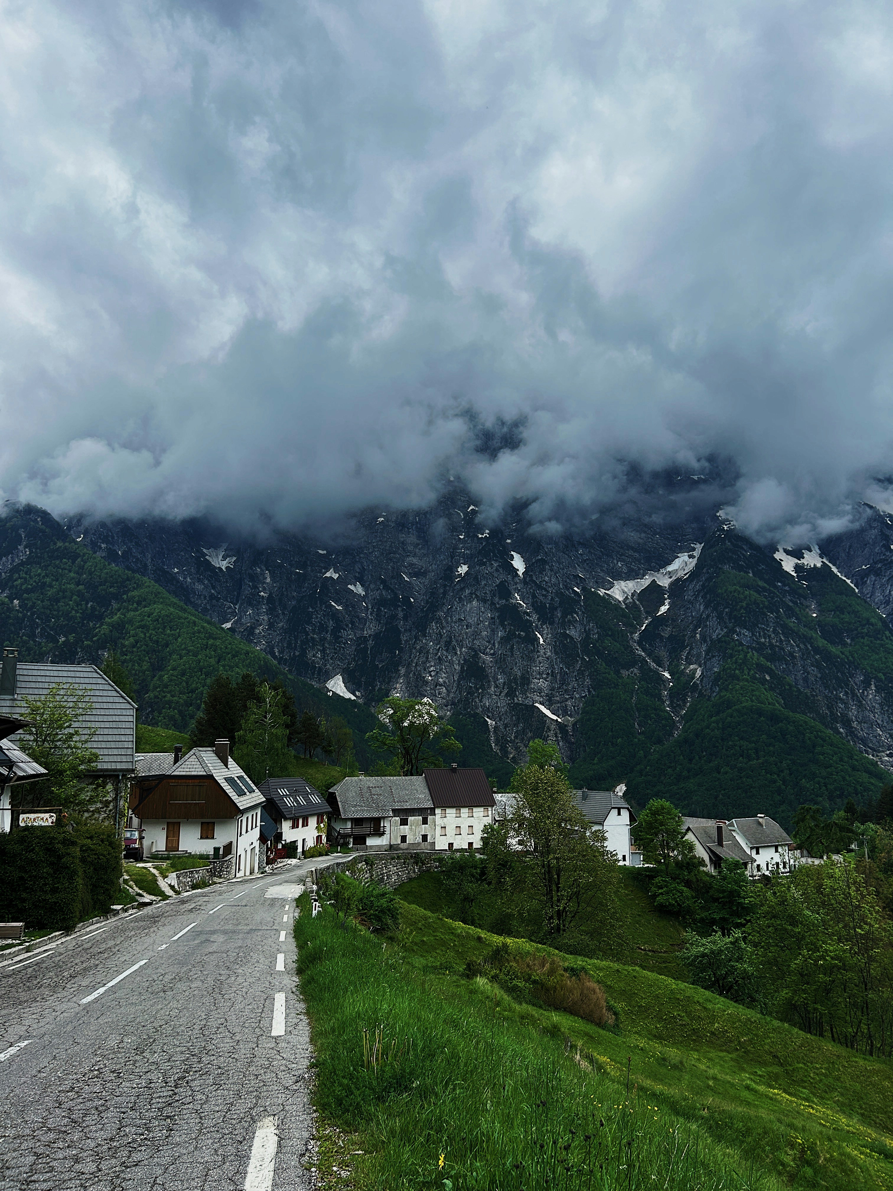 Cloud Curtain over a Quiet Alpine Village