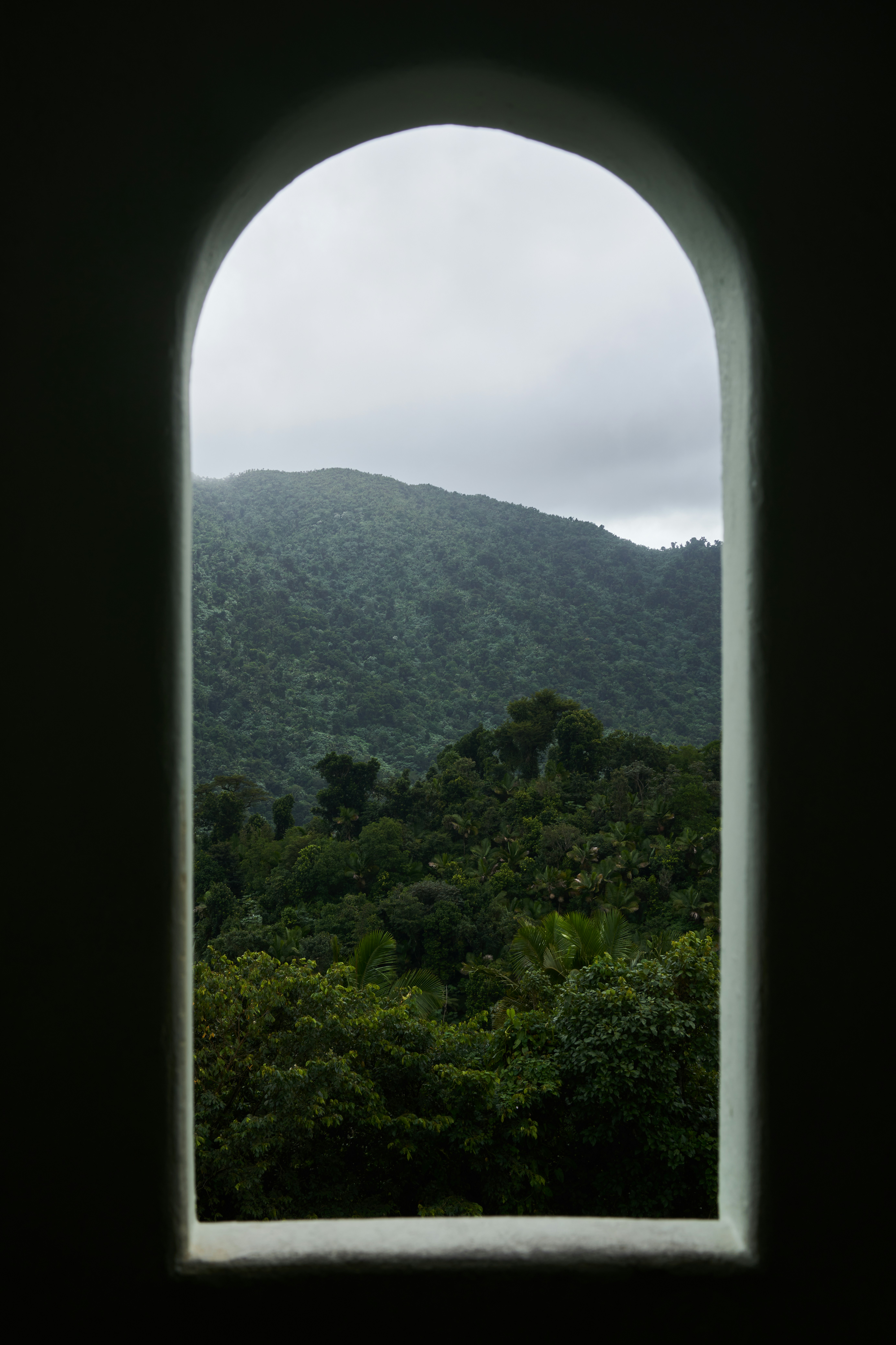 A view of a mountain through a window photo – Free Puerto rico Image on ...