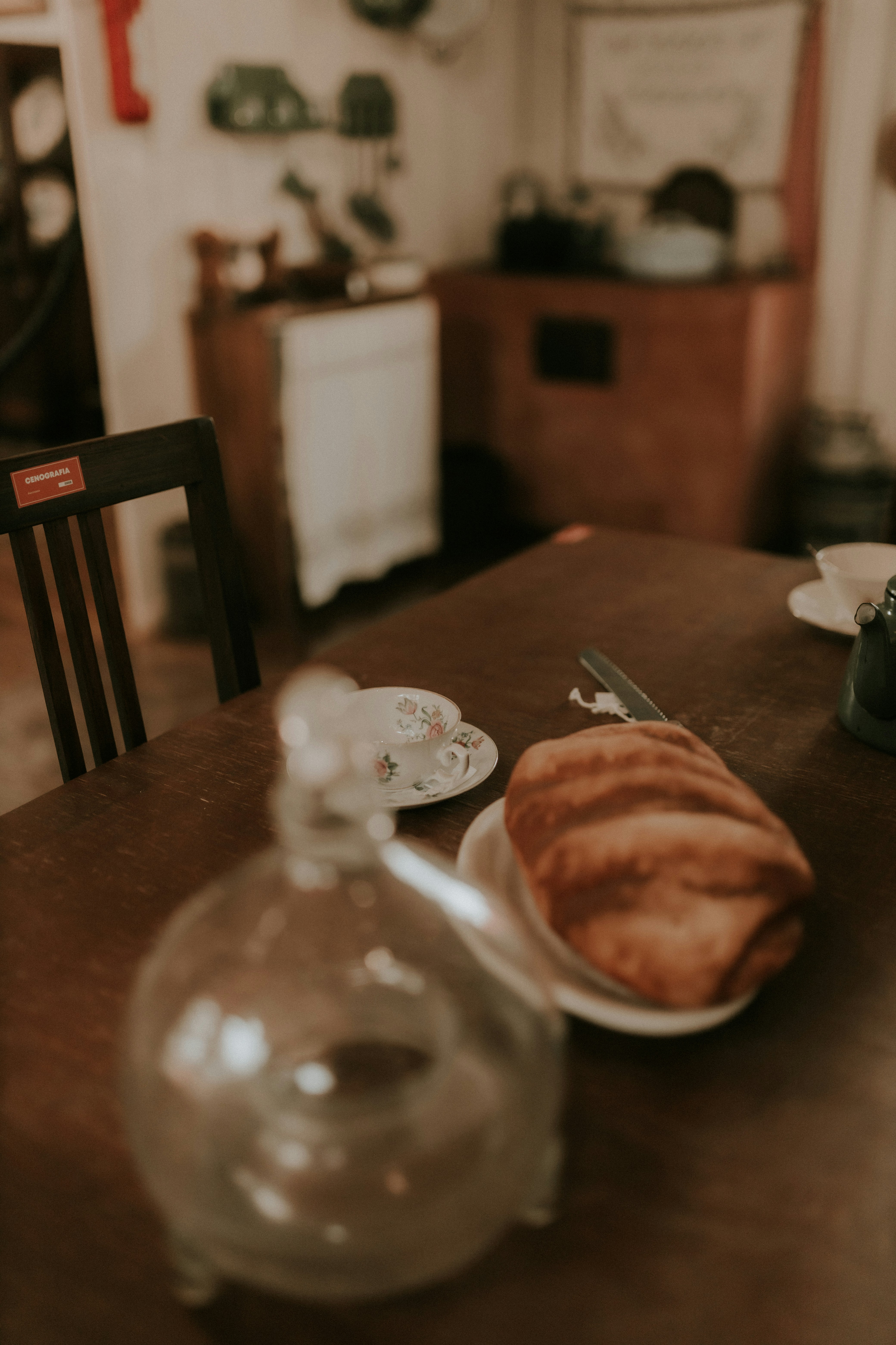 Amber Light on a Quiet Table: Rustic Loaf in Focus