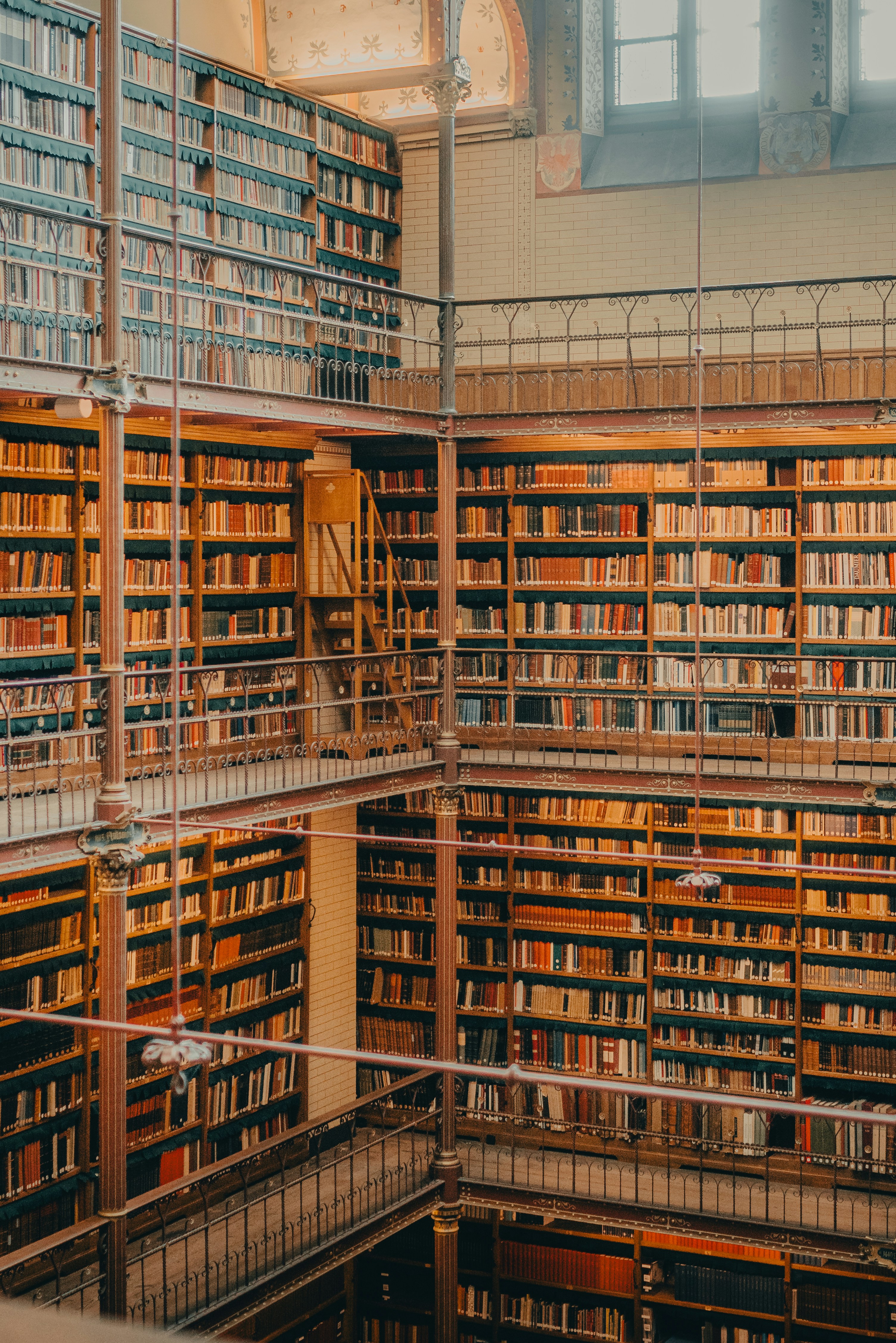 A large library filled with lots of books photo – Free Amsterdam Image ...