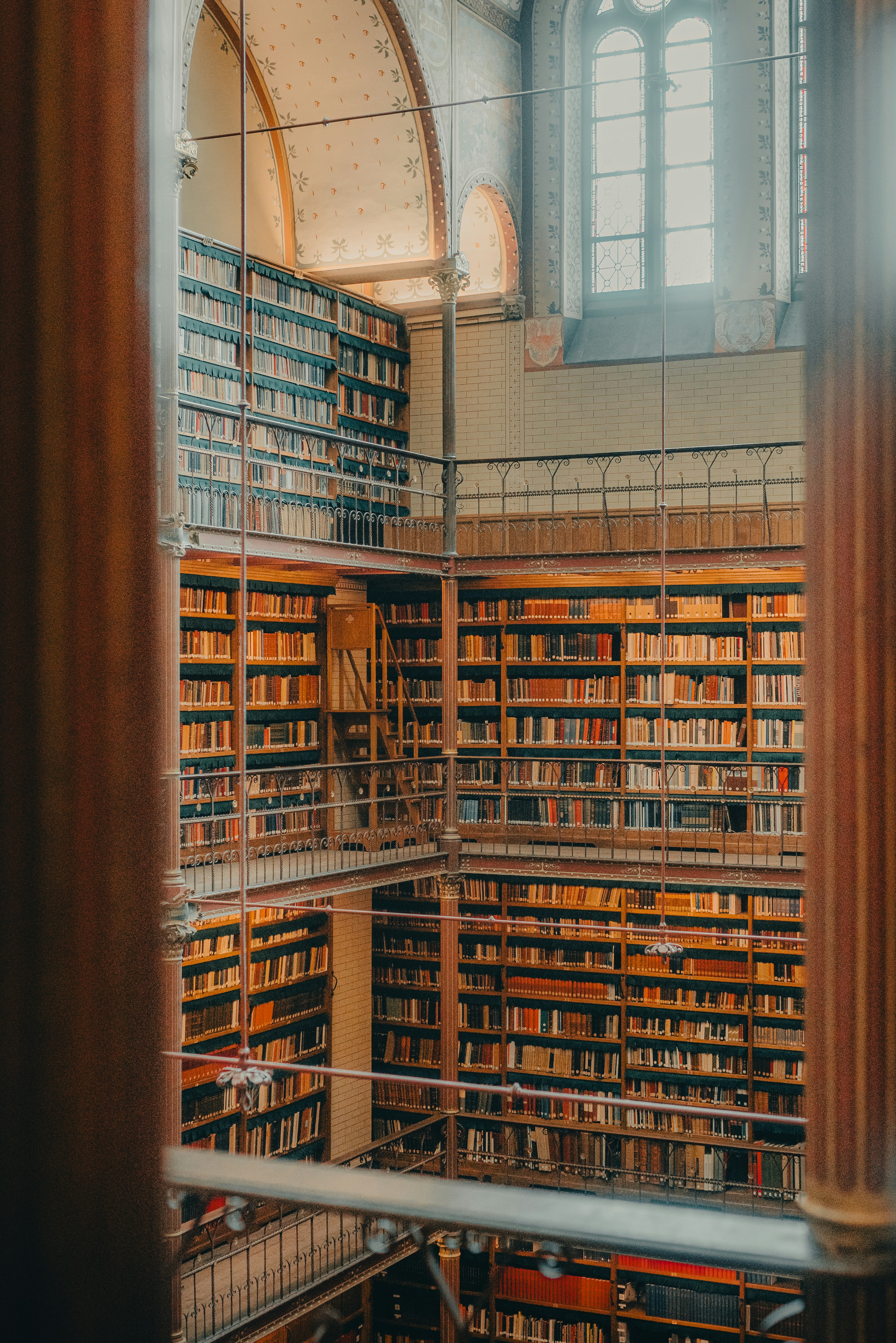 A large library filled with lots of books photo – Free Amsterdam Image ...