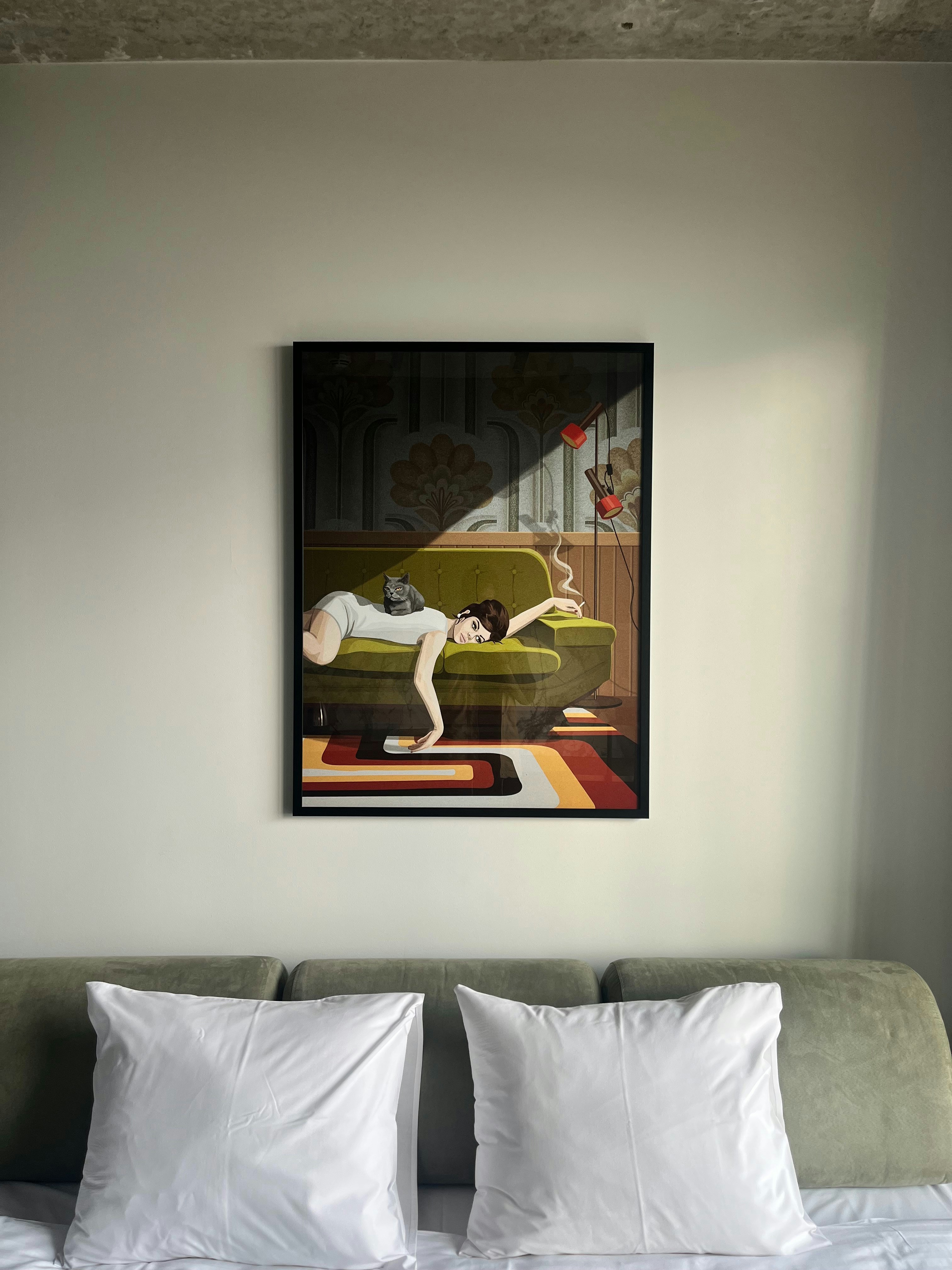 A bedroom with a bed and a painting on the wall photo – Free Estonia ...