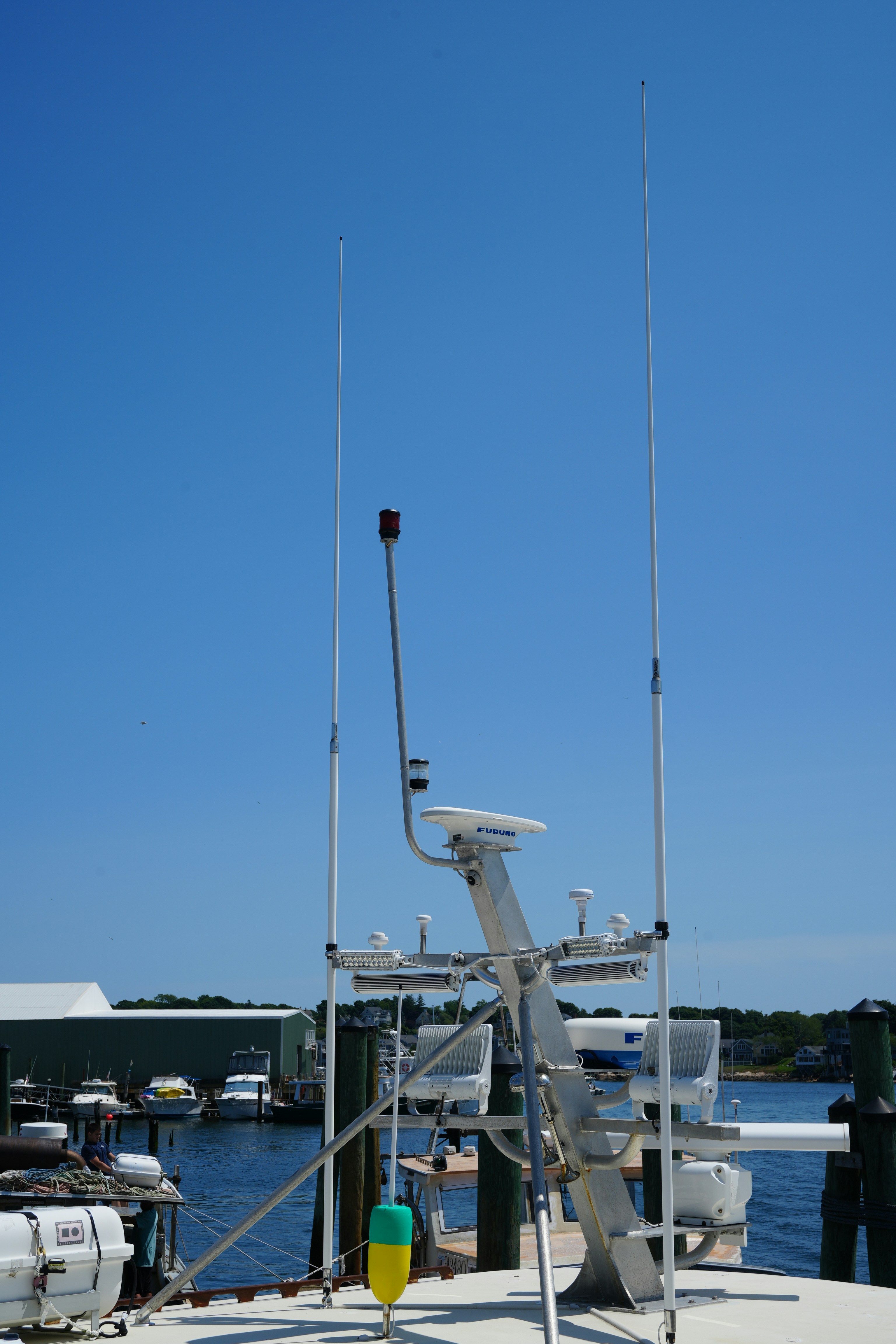 Maritime Gear Stands Tall Against a Blue Harbor Sky