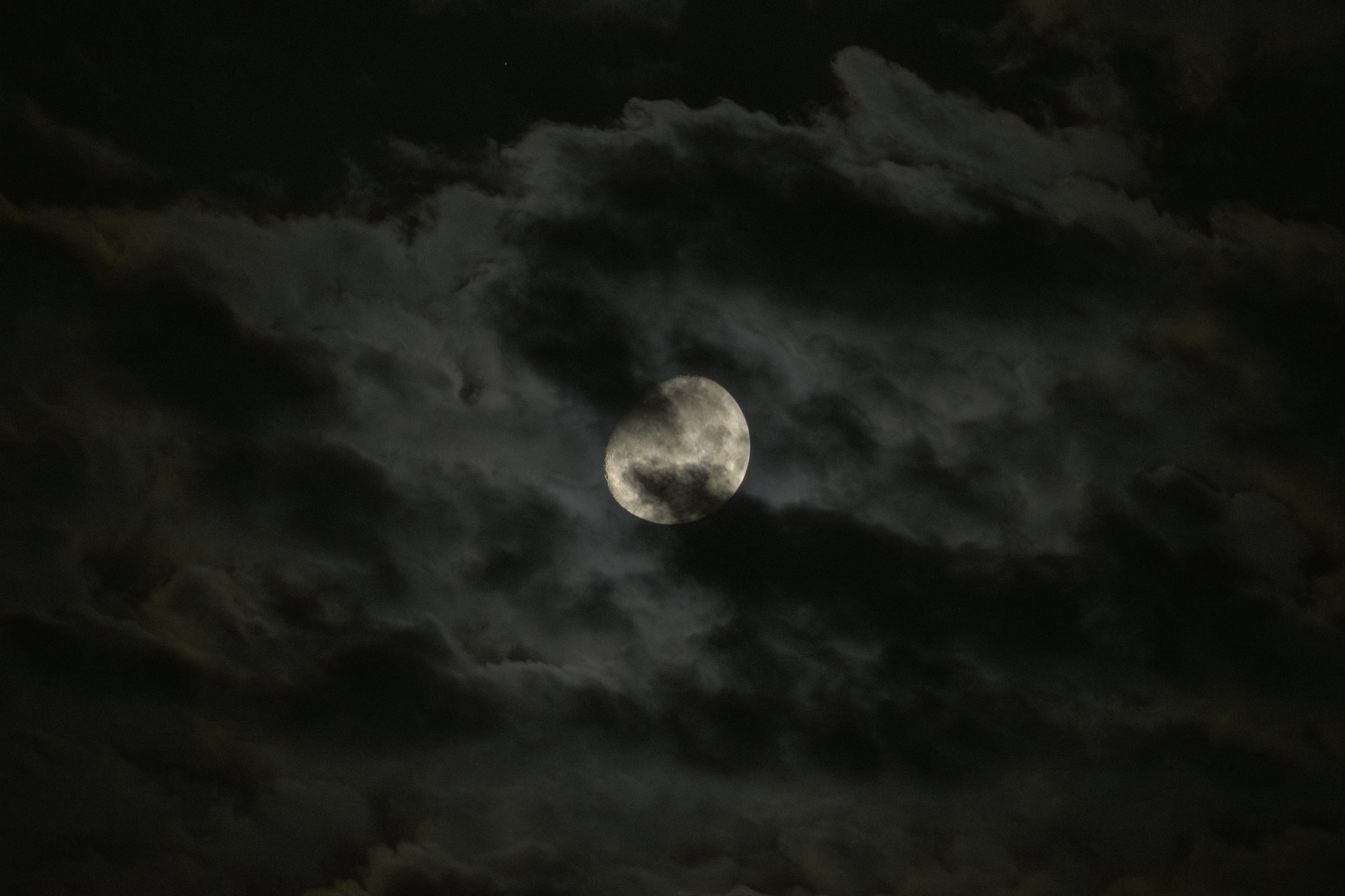A full moon is seen through the clouds photo – Free Iran Image on Unsplash