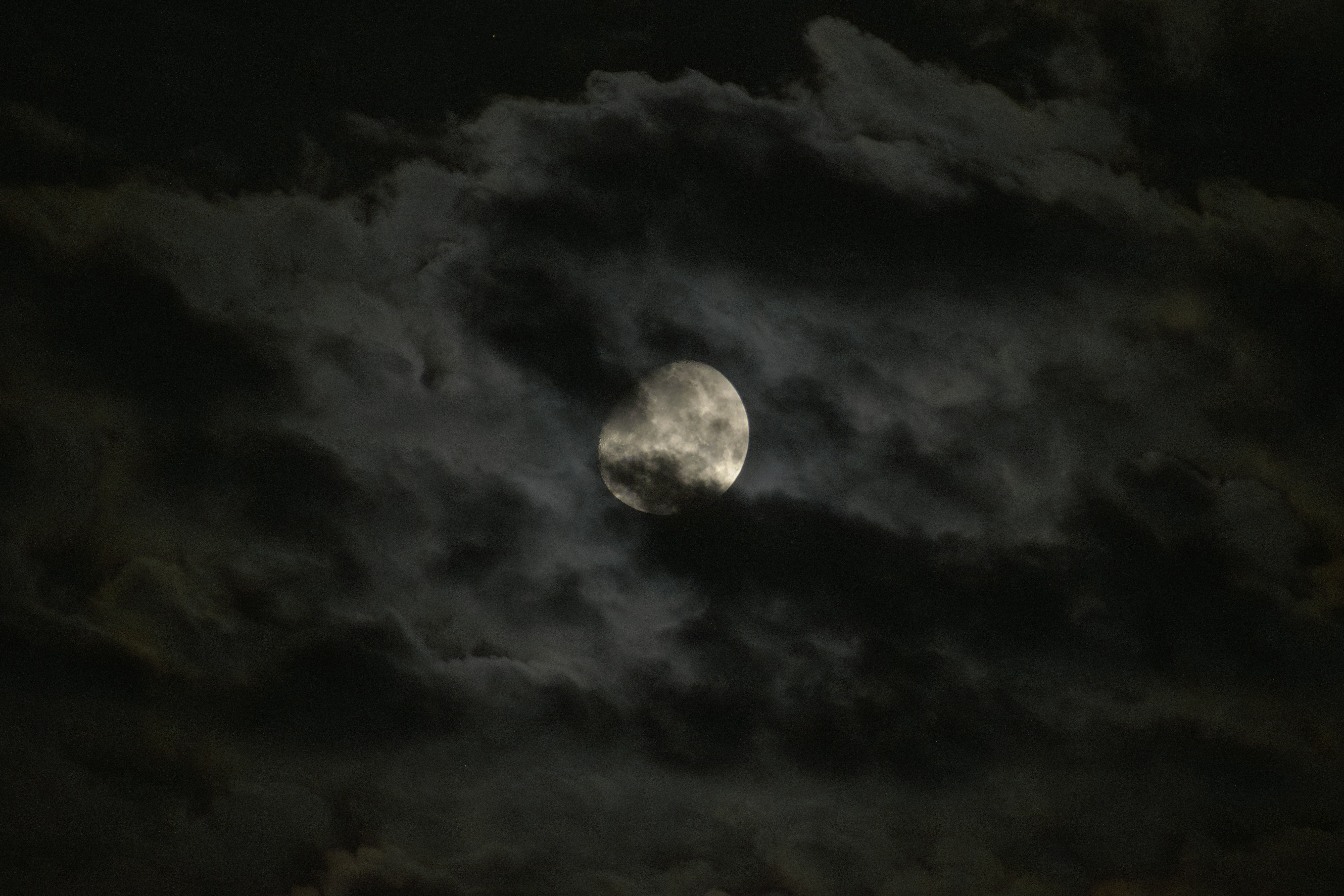 A full moon is seen through the clouds photo – Free Iran Image on Unsplash