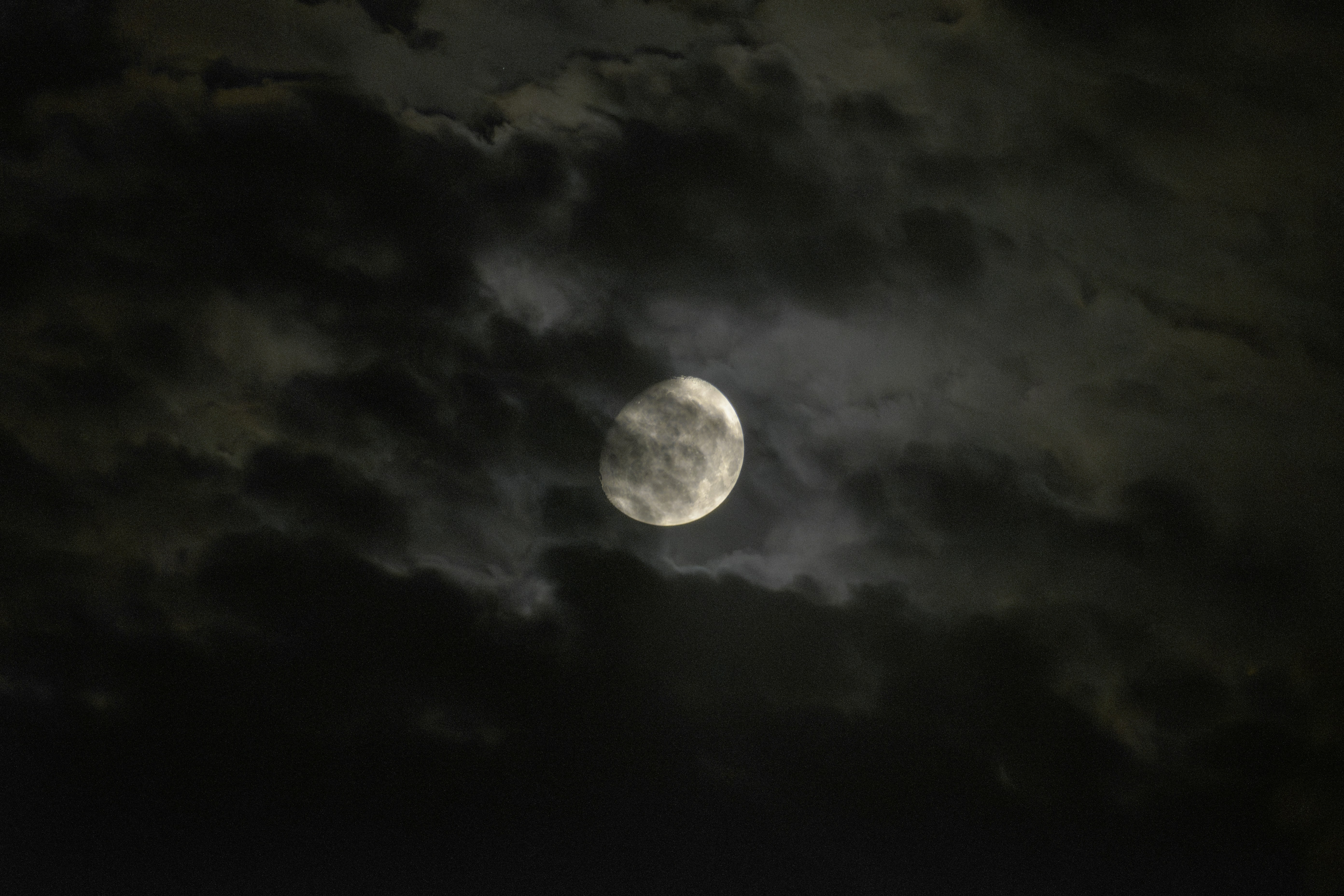 A full moon is seen through the clouds photo – Free Iran Image on Unsplash