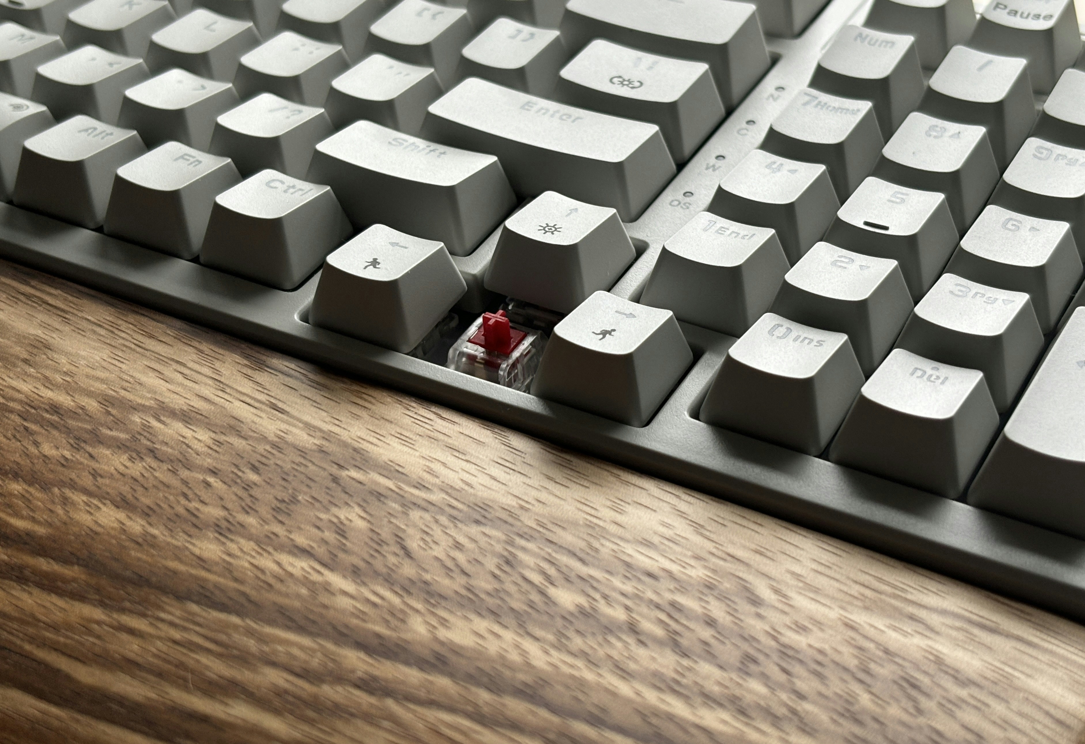 A computer keyboard sitting on top of a wooden desk photo – Free ...