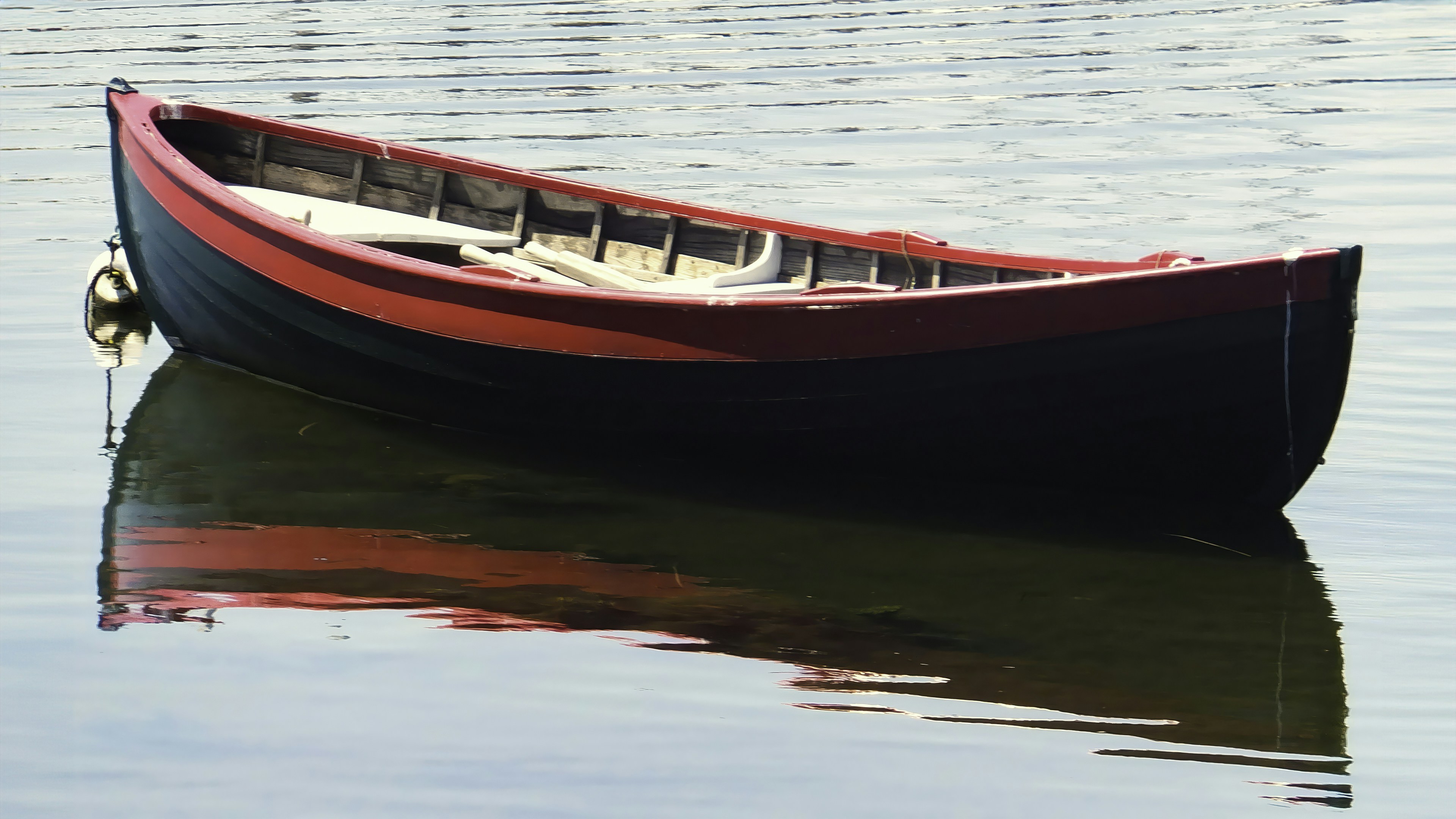 Red-Trim Rowboat on a Glassy Lake, Echoes of a Quiet Afternoon