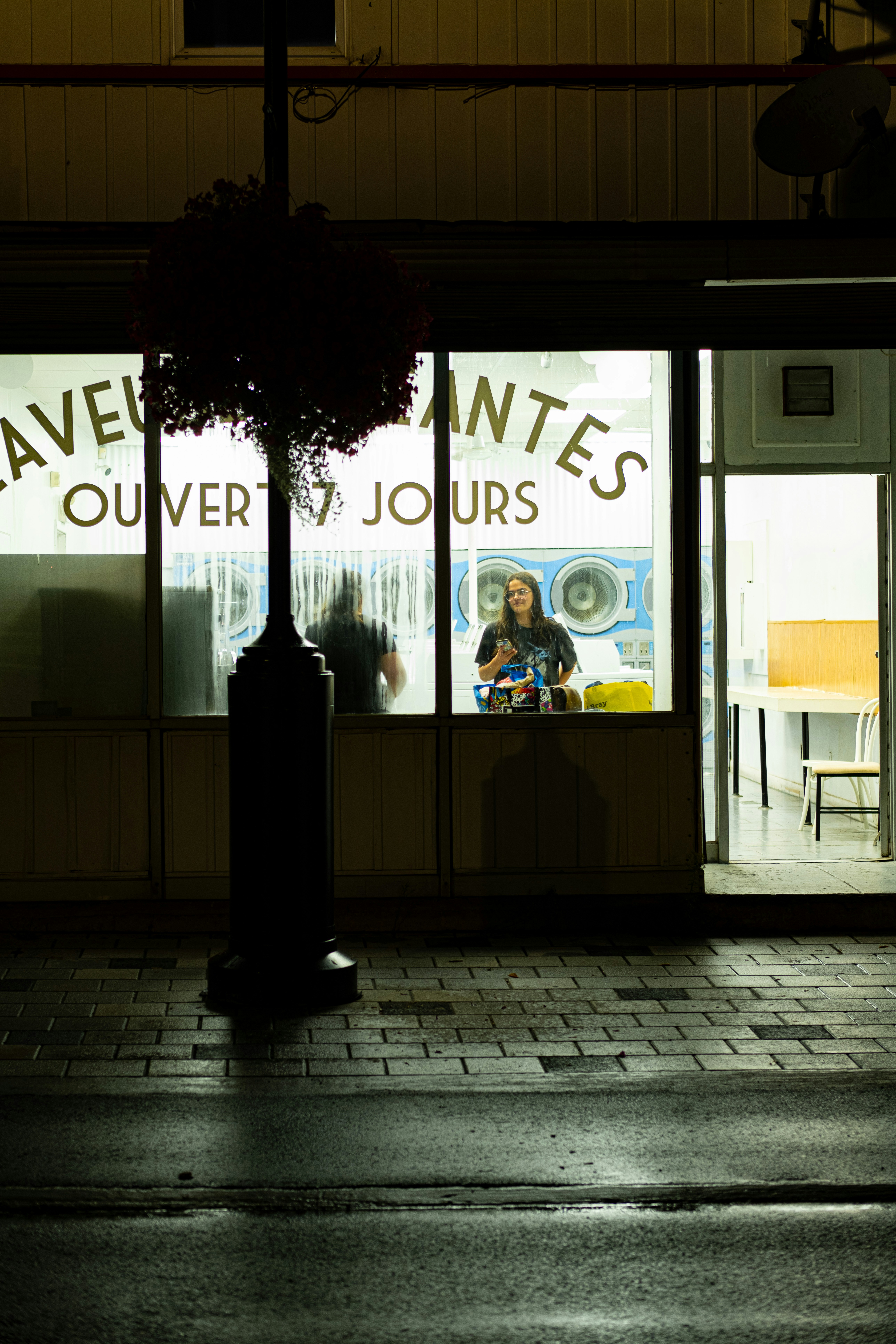 Midnight Café Window: Portrait in a Quiet Shopfront