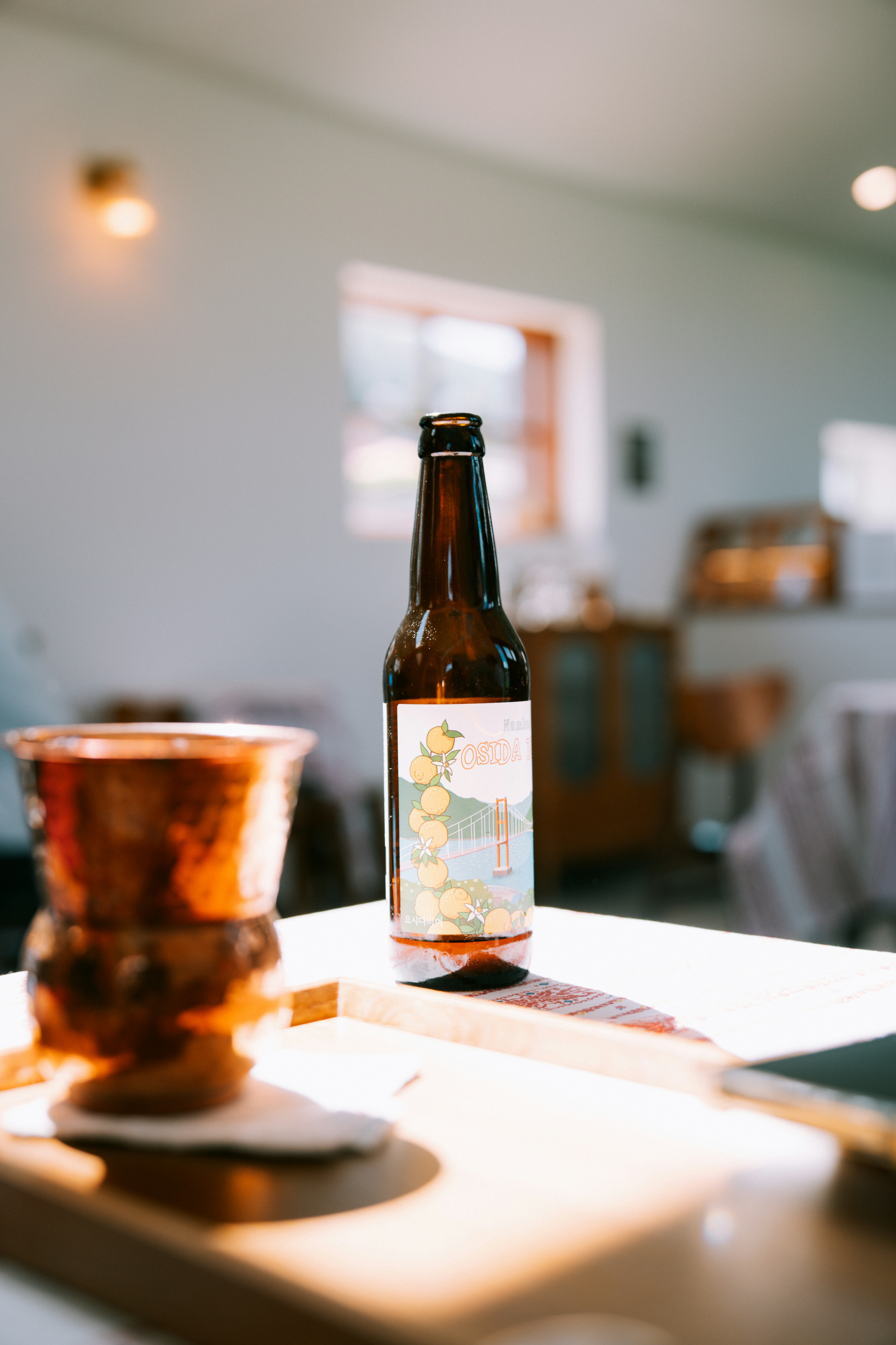 Amber Label, Soft Focus: A Bottle Framed by Morning Light
