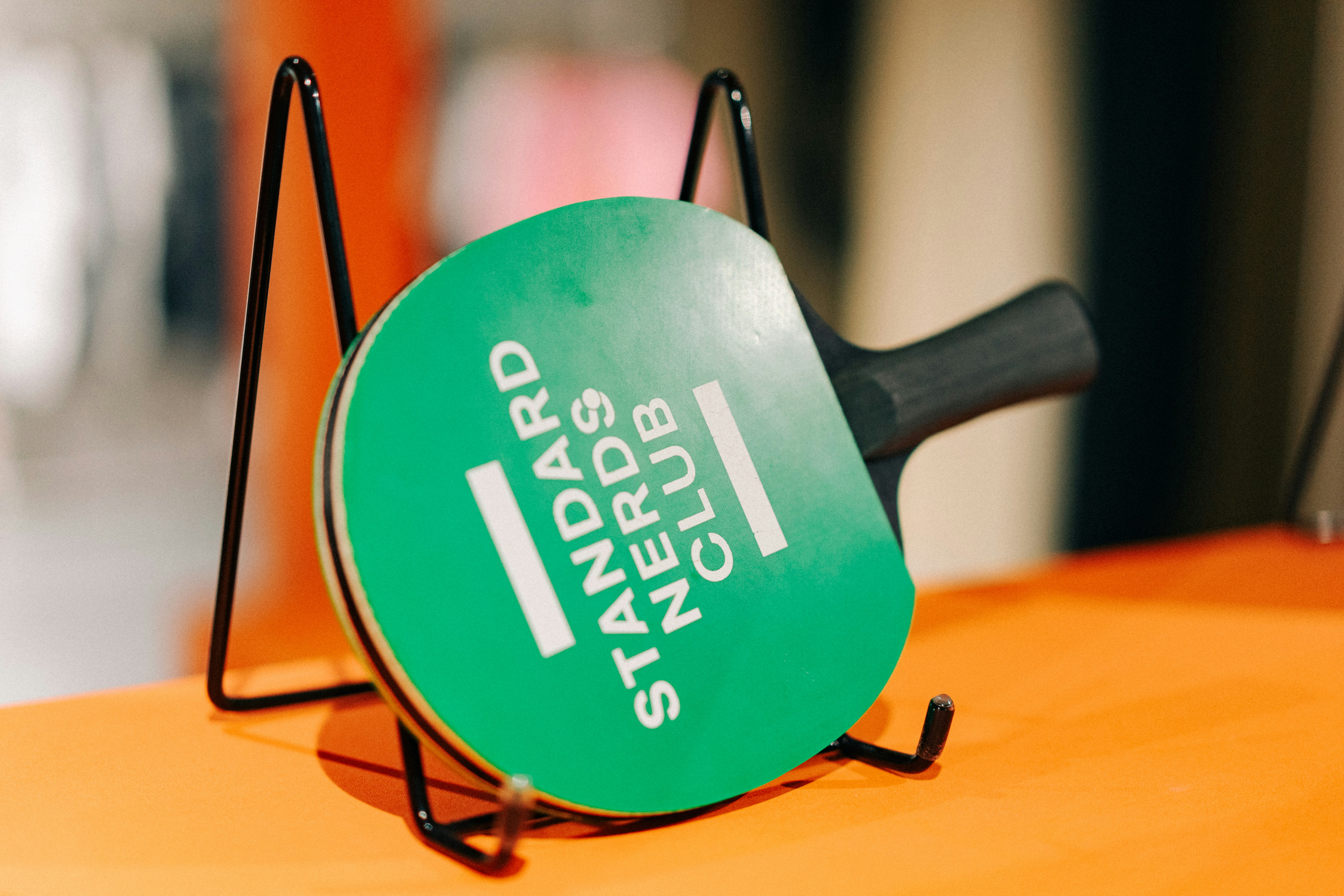 A close up of a tennis racket on a table photo – Free Racket Image on ...