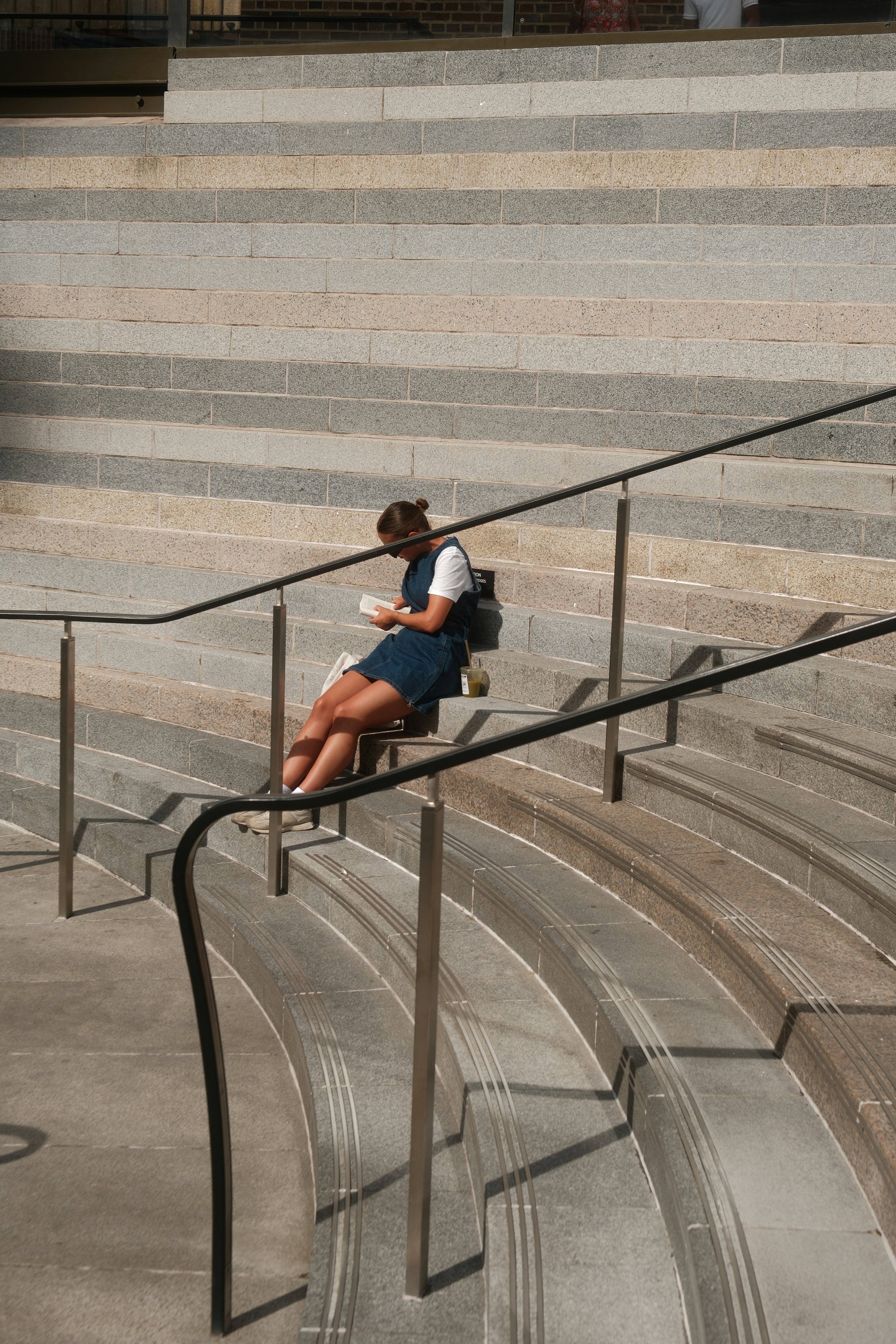 Study Break on Sunlit Curved Steps