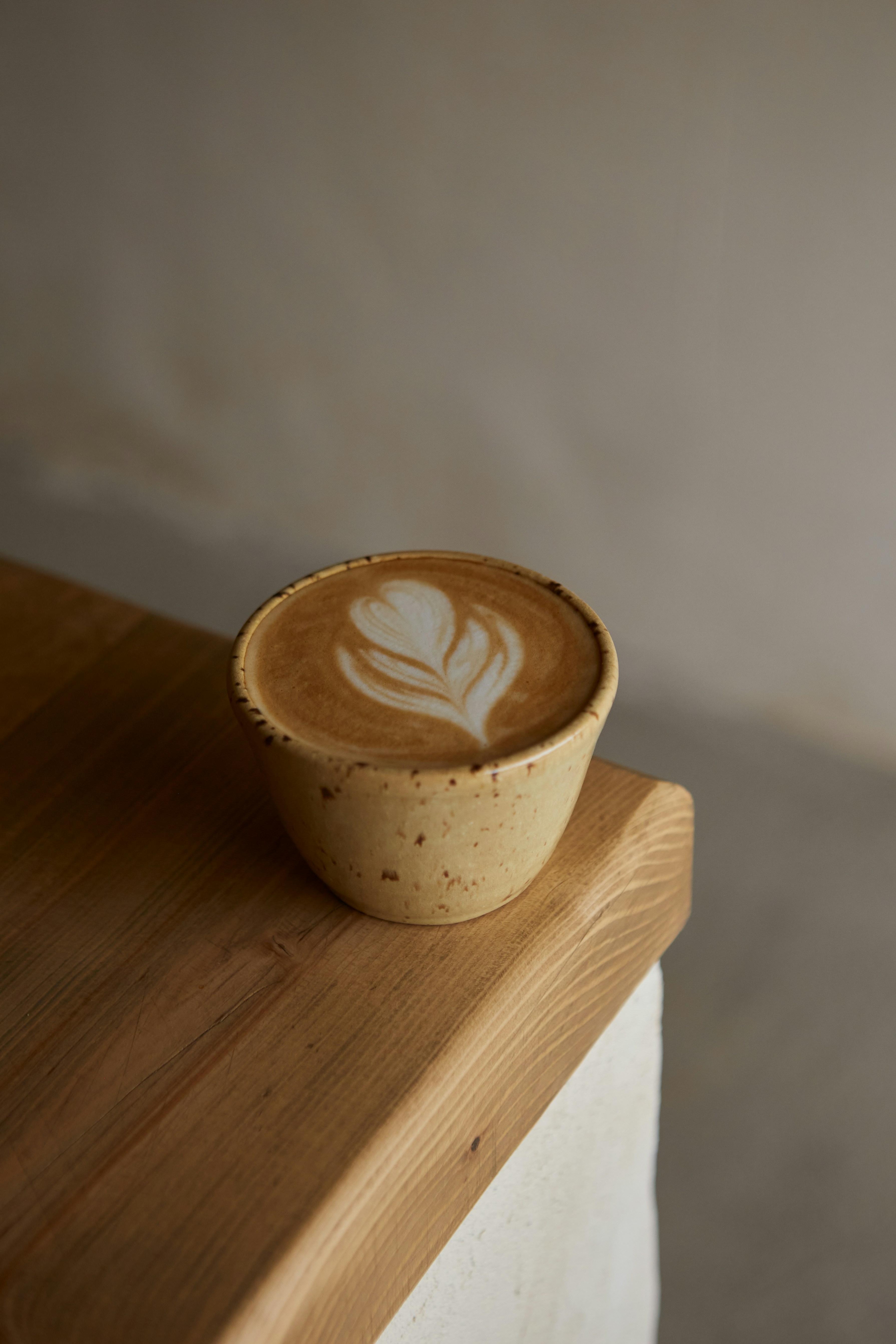 Heart in Foam on a Weathered Wooden Edge