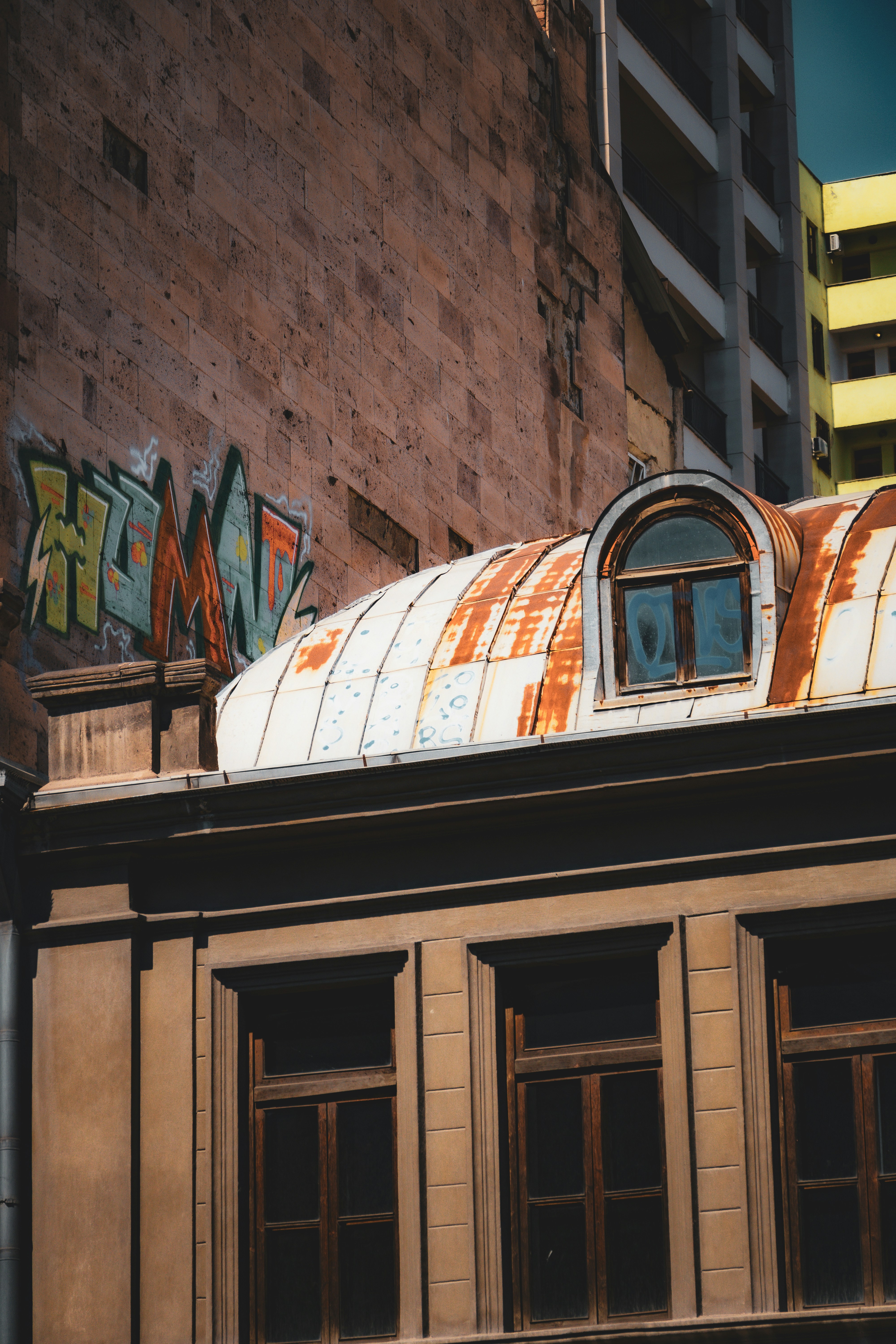 An old train car sitting on top of a building