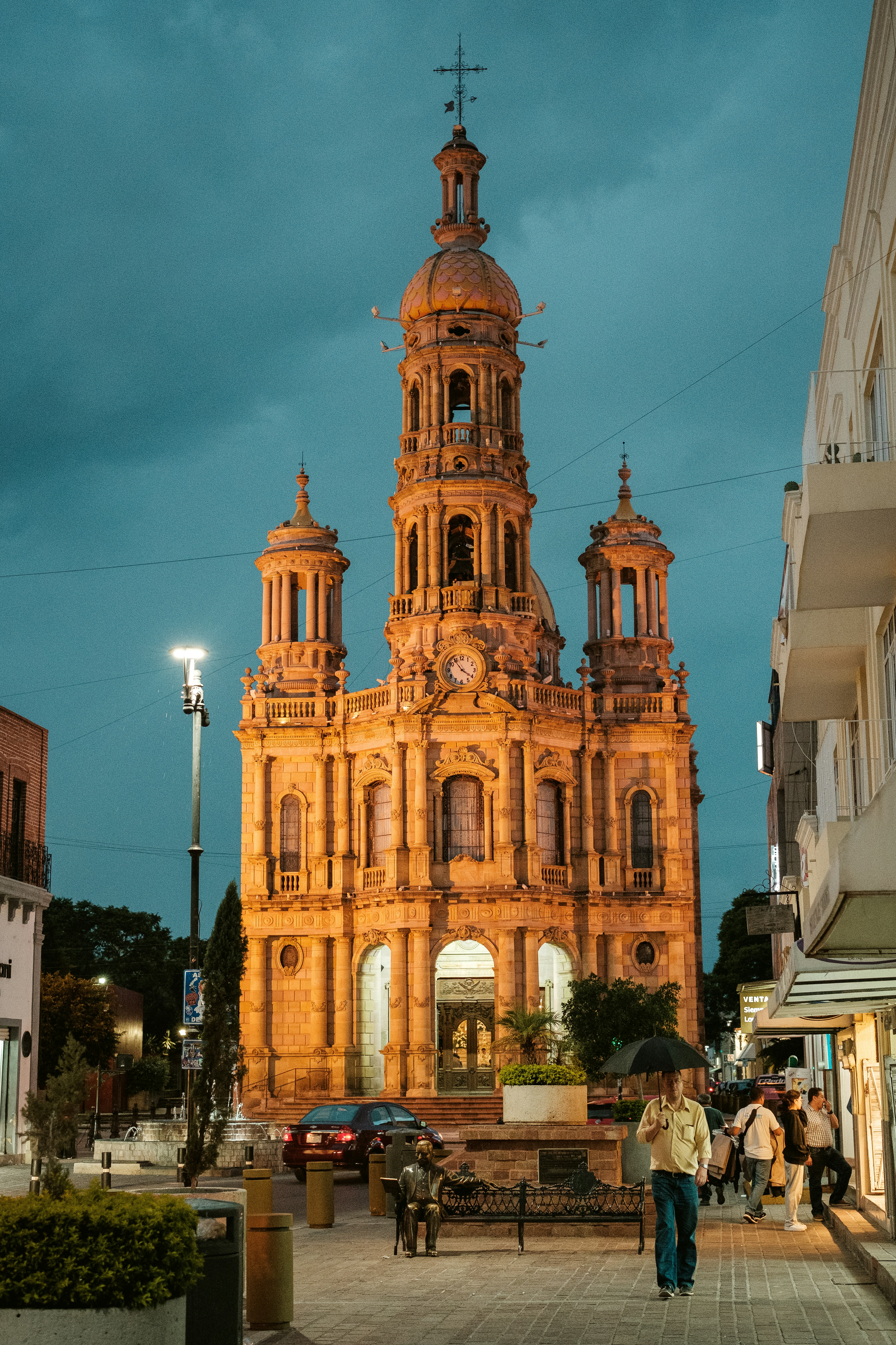 Night-Warmed Baroque Cathedral Tower in a Quiet City Square