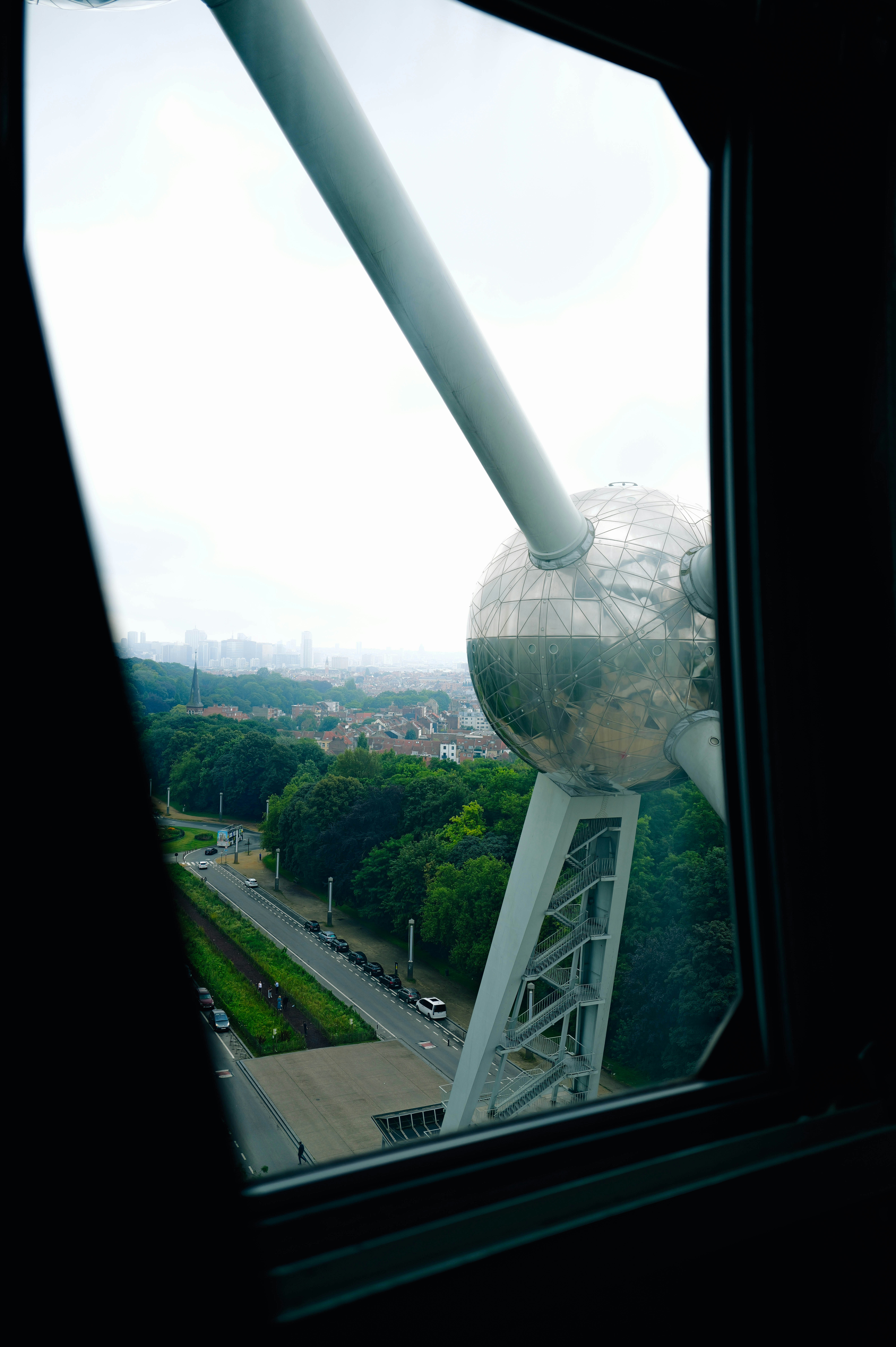A view of a city through a window photo – Free Cityscape Image on Unsplash