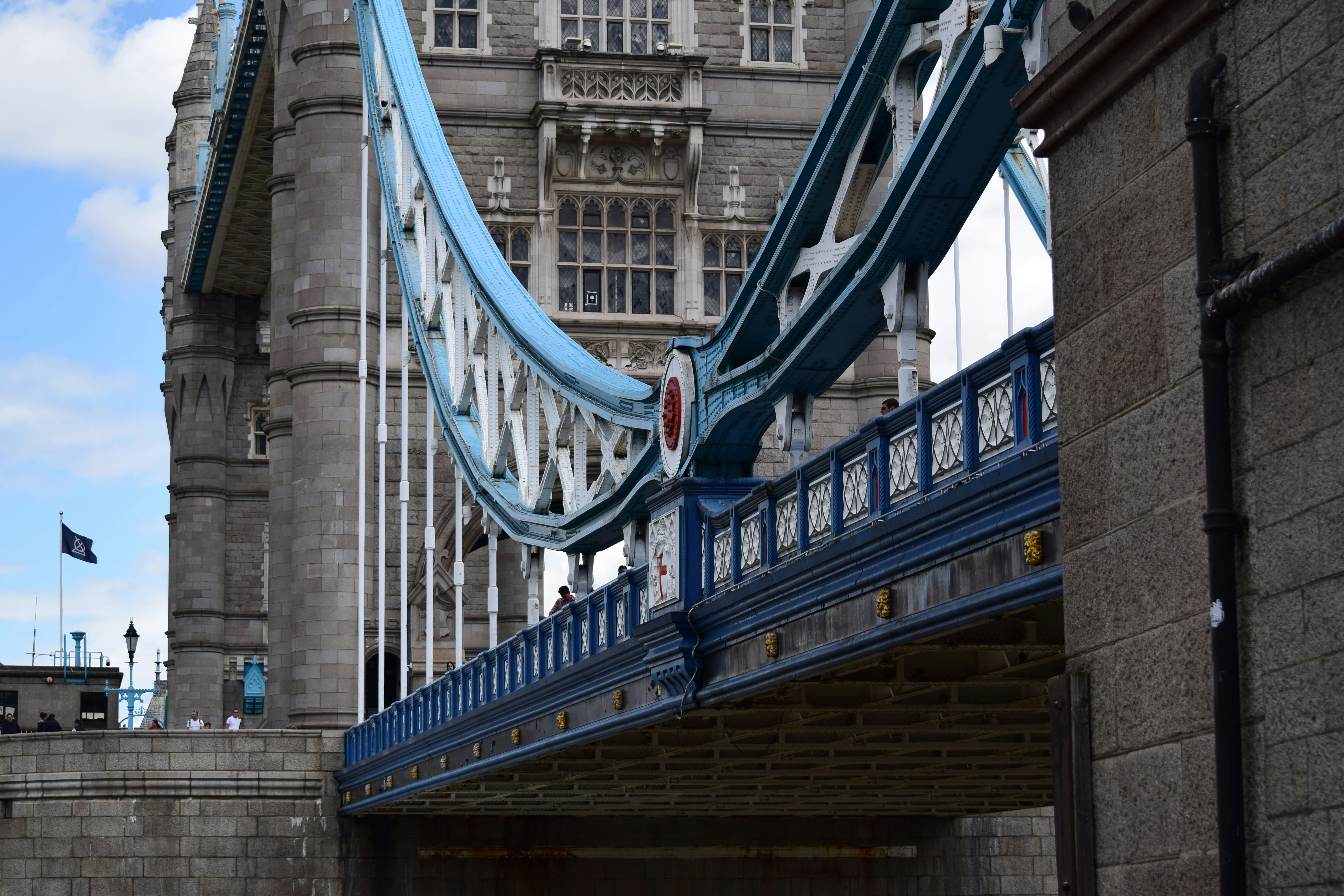 Blue Archways and Stone Grandeur: Tower Bridge in Daylight