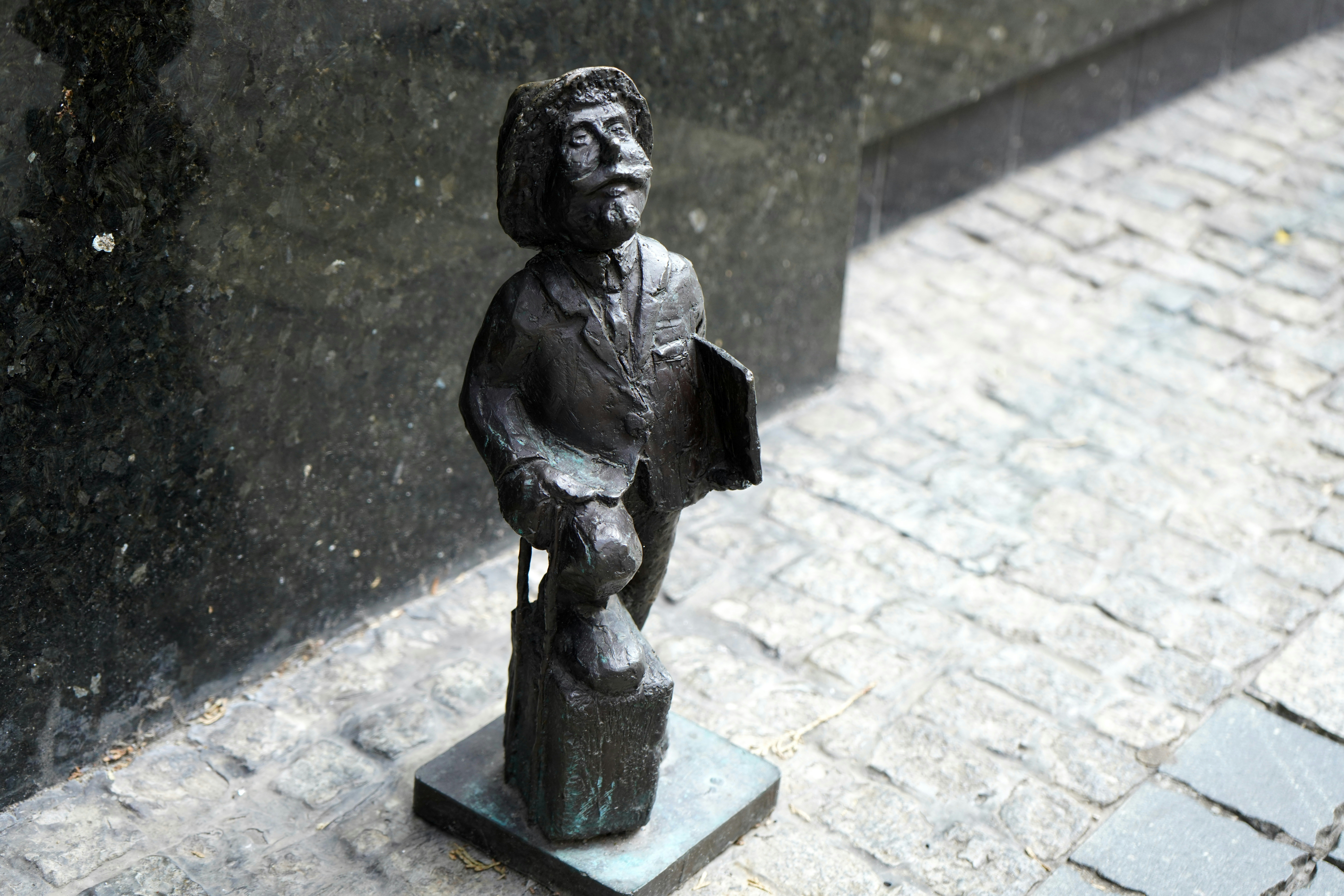 Bronze Street Booth: A Small Figure with a Big Gaze