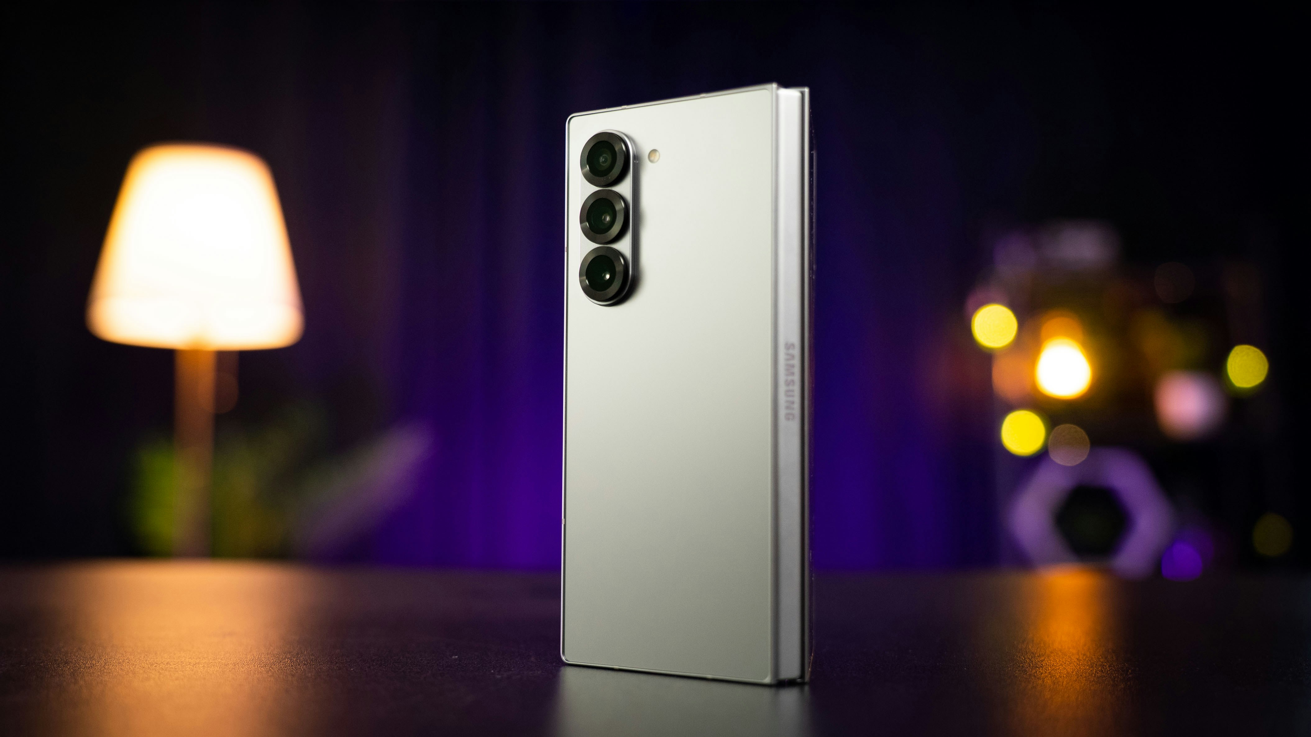 A close up of a cell phone on a table photo – Free Human Image on Unsplash