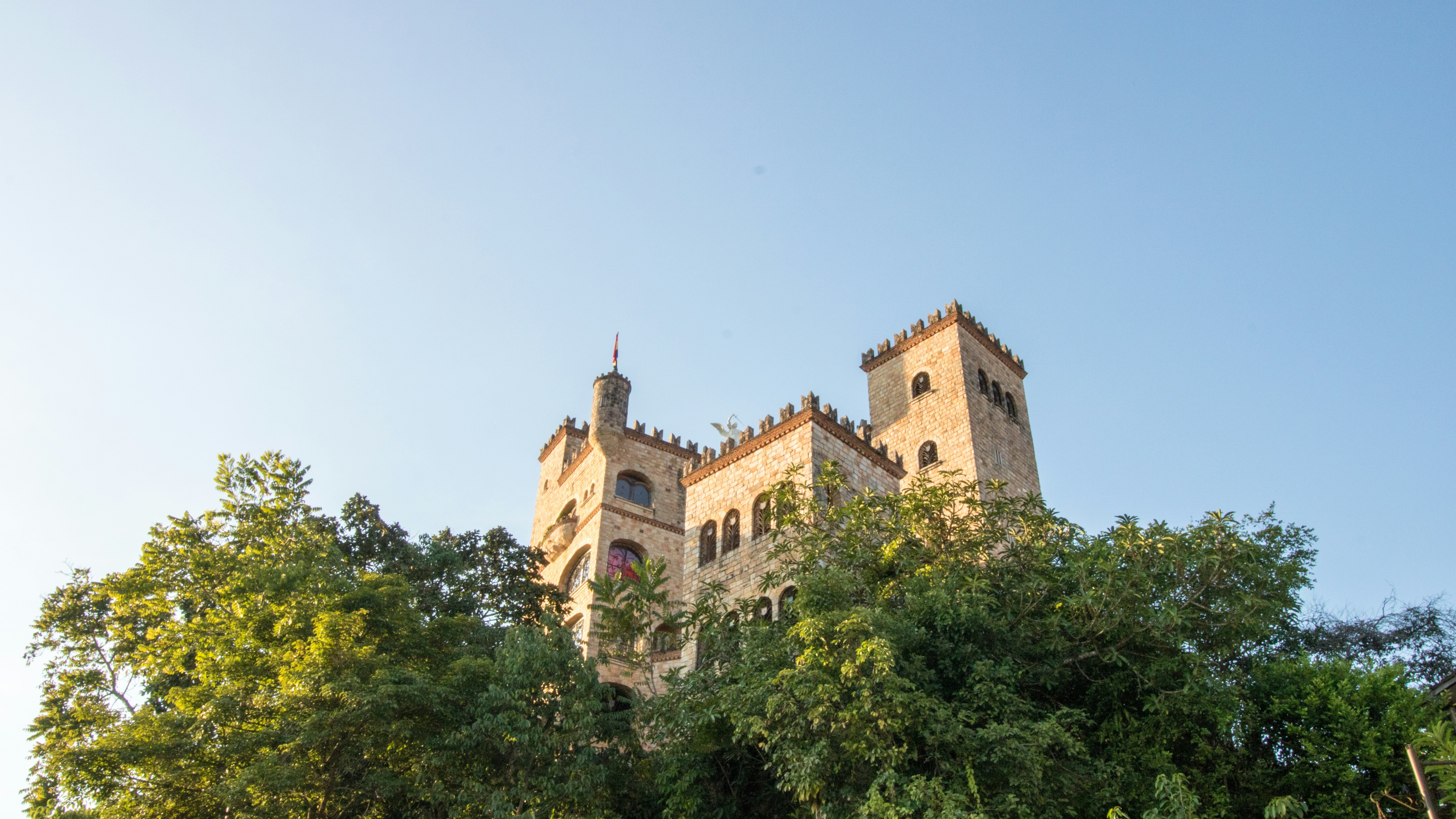 A castle with a clock tower on top of it photo – Free Perú Image on ...