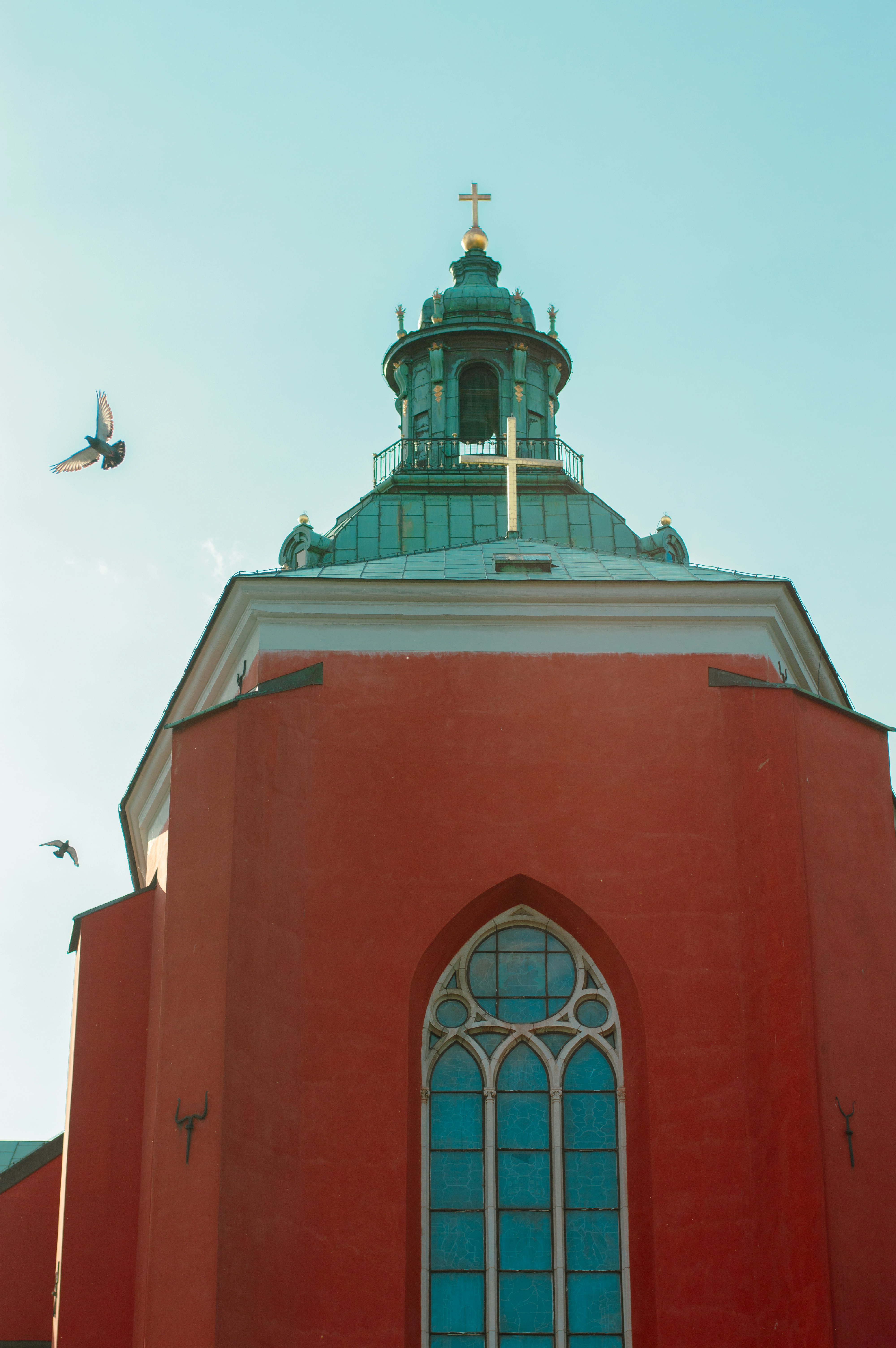 Crimson Facade, Verdant Cupola: A Cathedral Reaches the Sky