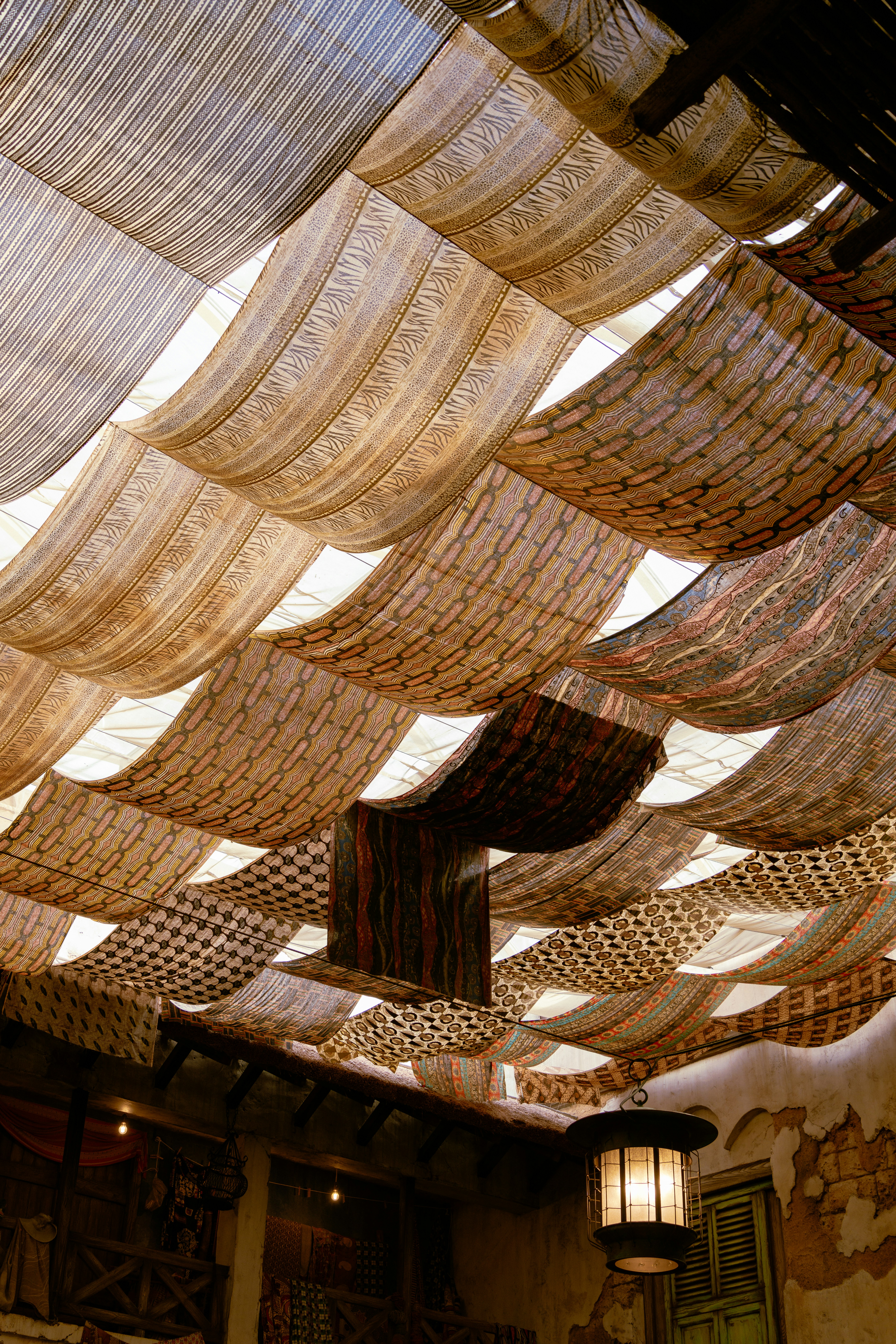A room with a ceiling made of woven material photo – Free Texture Image ...
