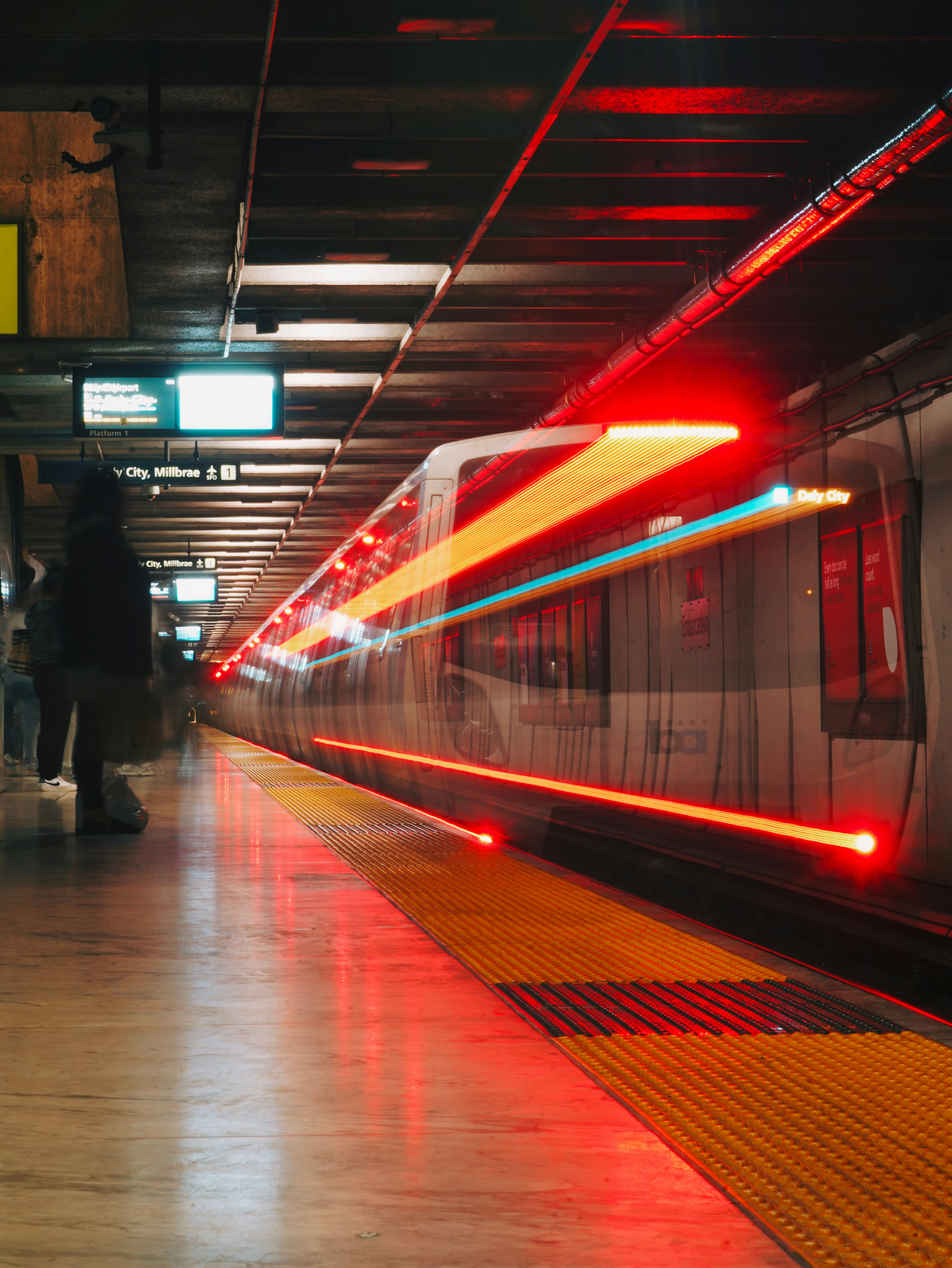A subway train pulling into a train station photo – Free San francisco ...