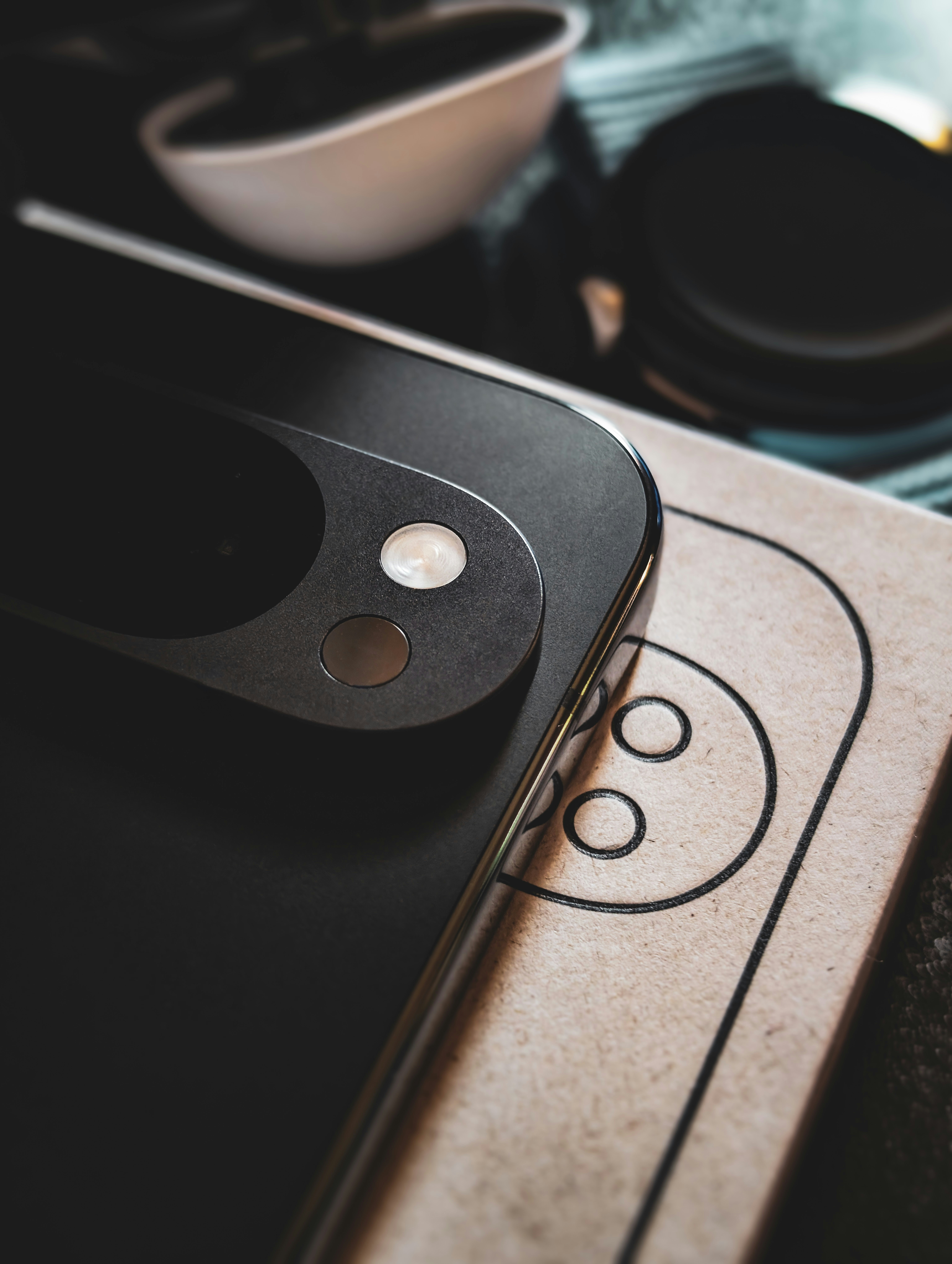 Close-up of a Phone Camera Prism: The Pixel 8 Pro on a Box