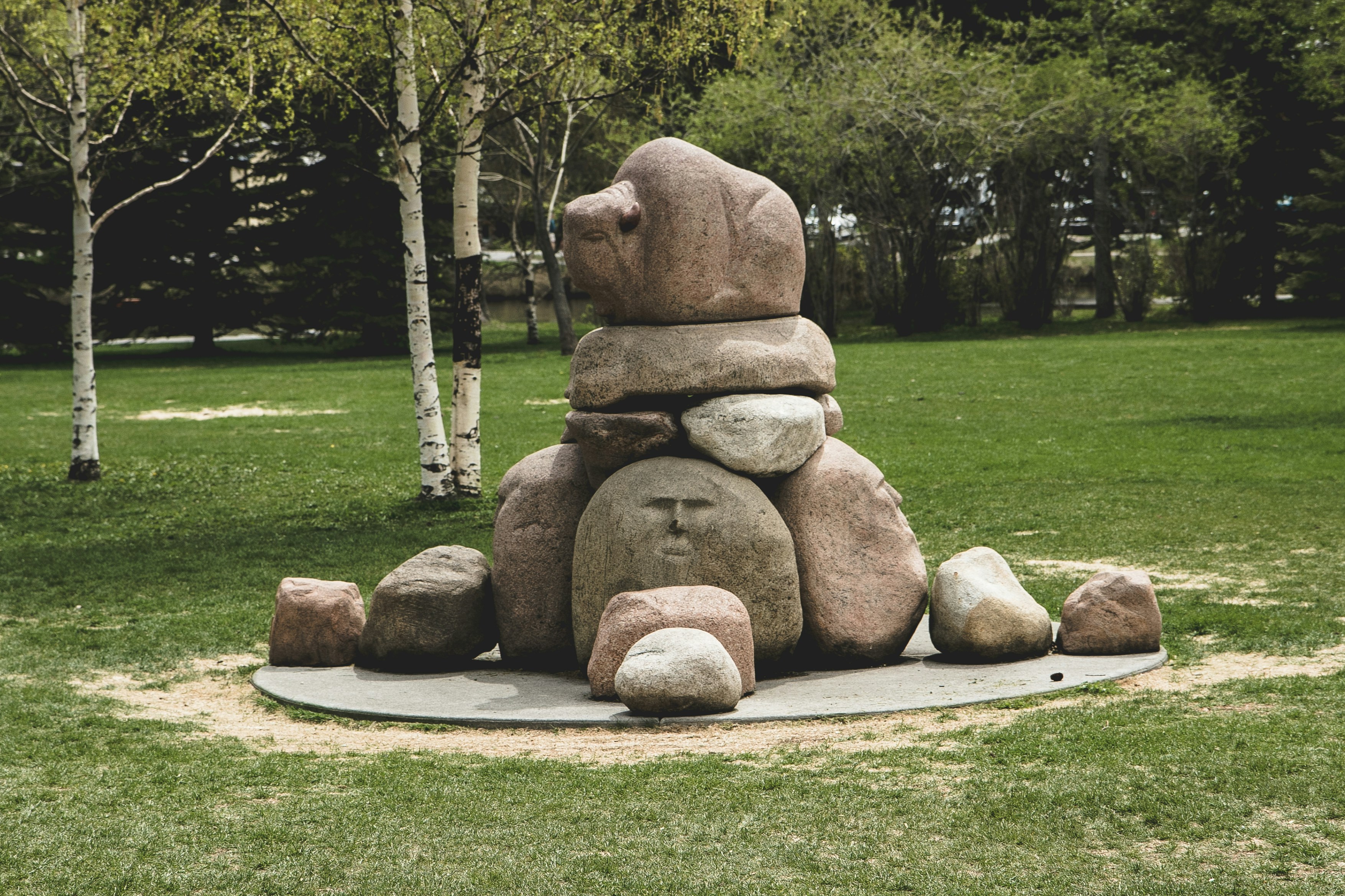 Stacked Stone Faces: A Quiet Cairn of Public Art