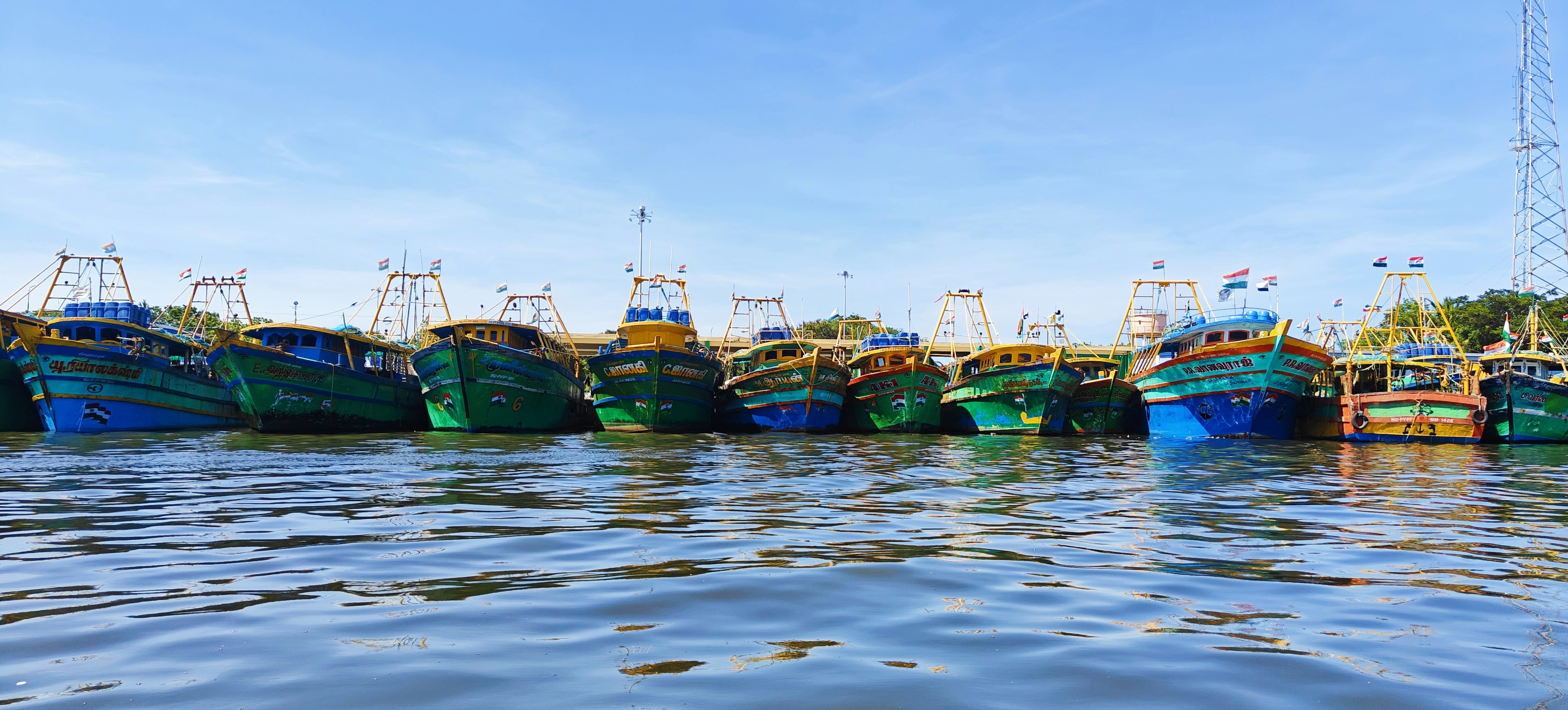 A bunch of boats that are sitting in the water