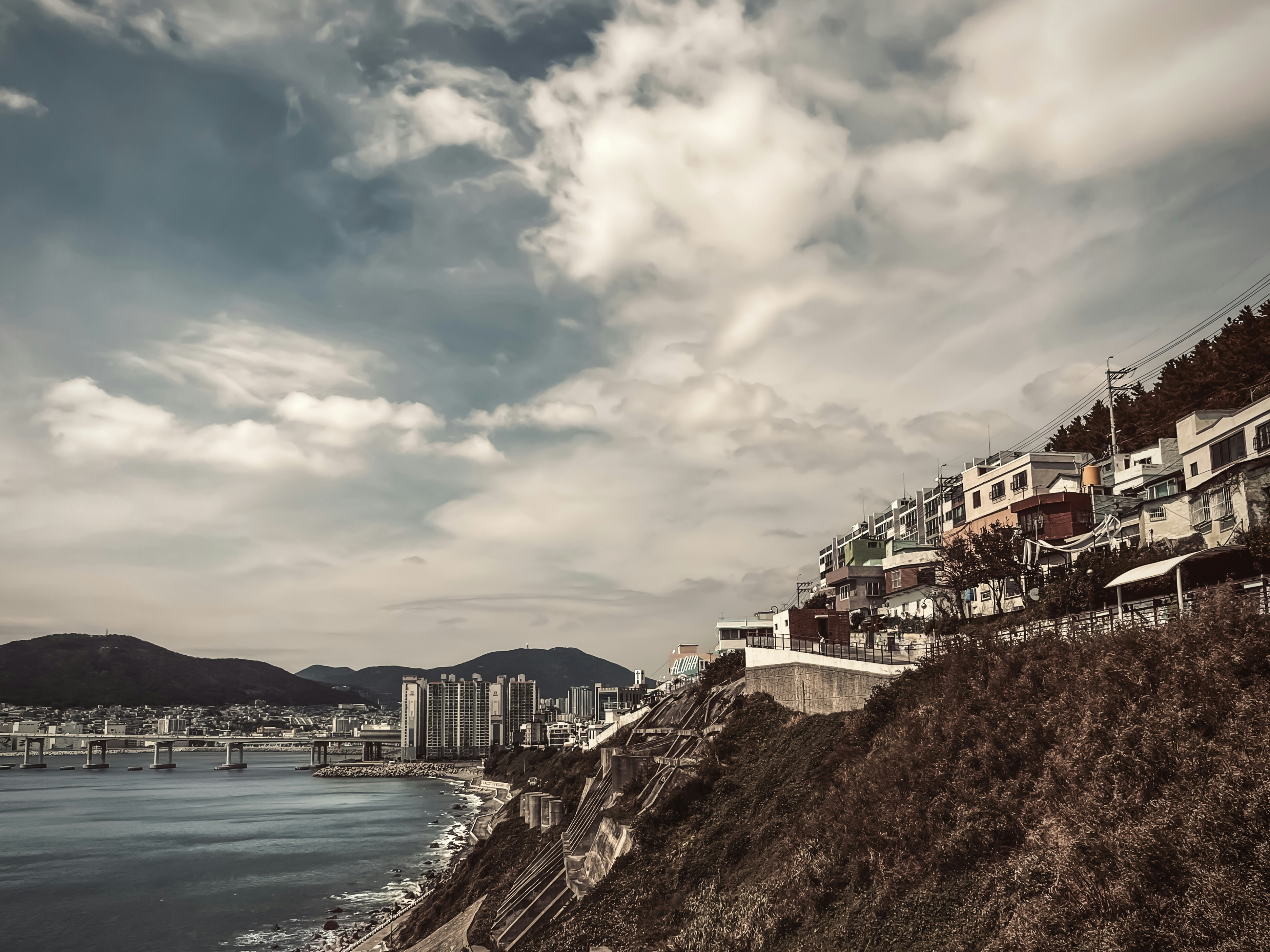 A view of a city on the edge of a cliff photo – Free Busan Image on ...