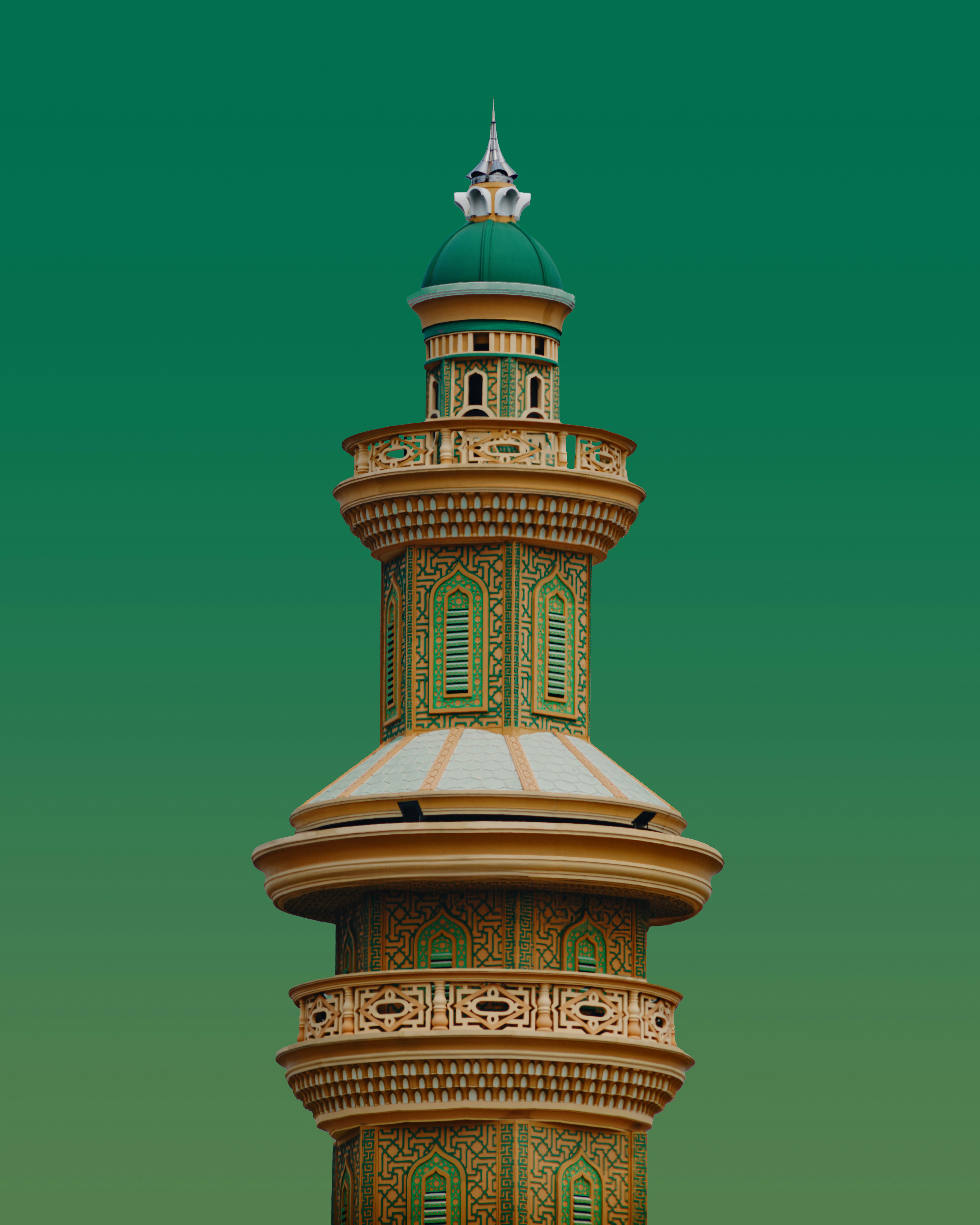 A tall tower with a star on top of it