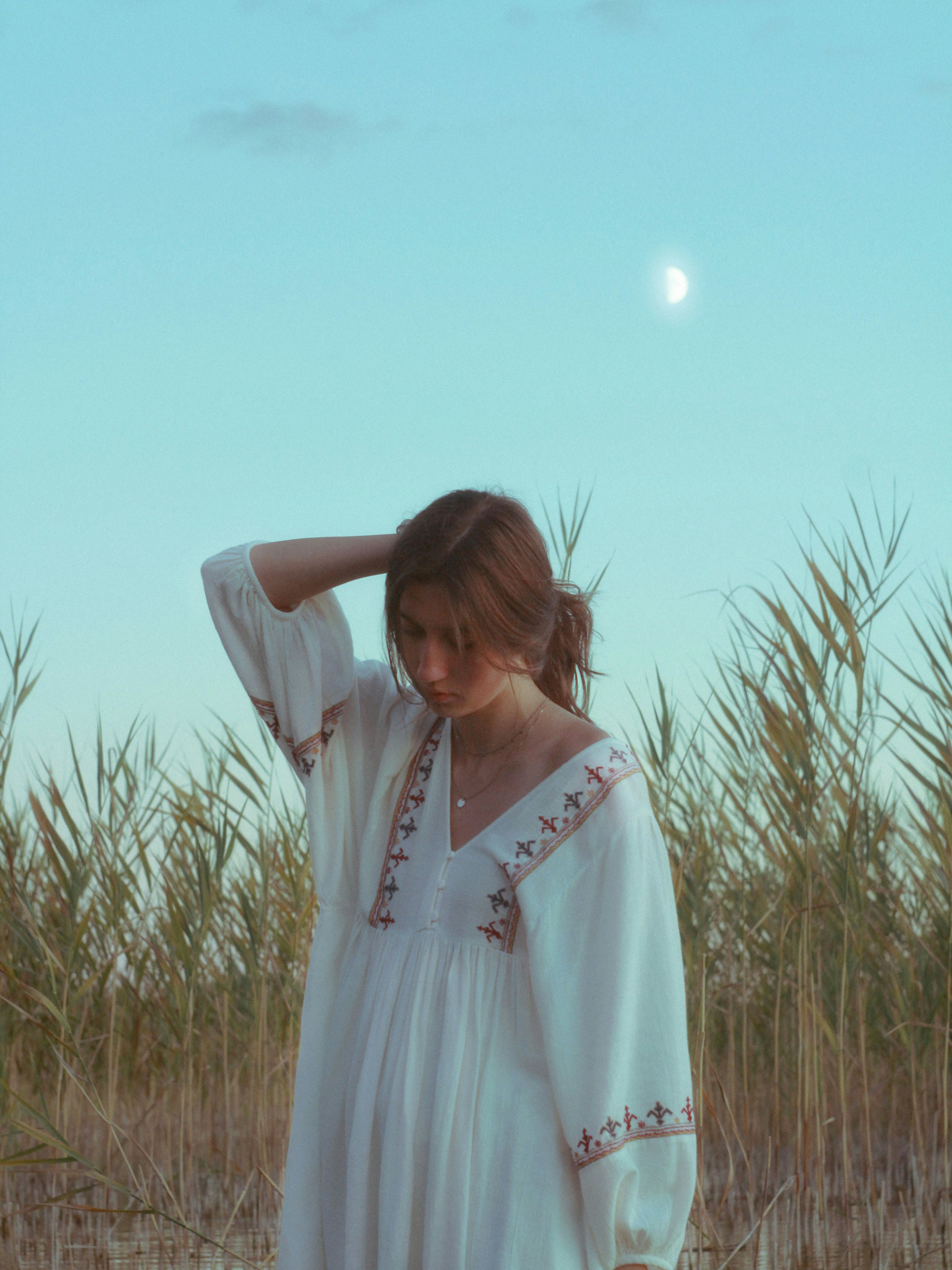 A woman in a white dress standing in a field photo – Free Volyn oblast ...