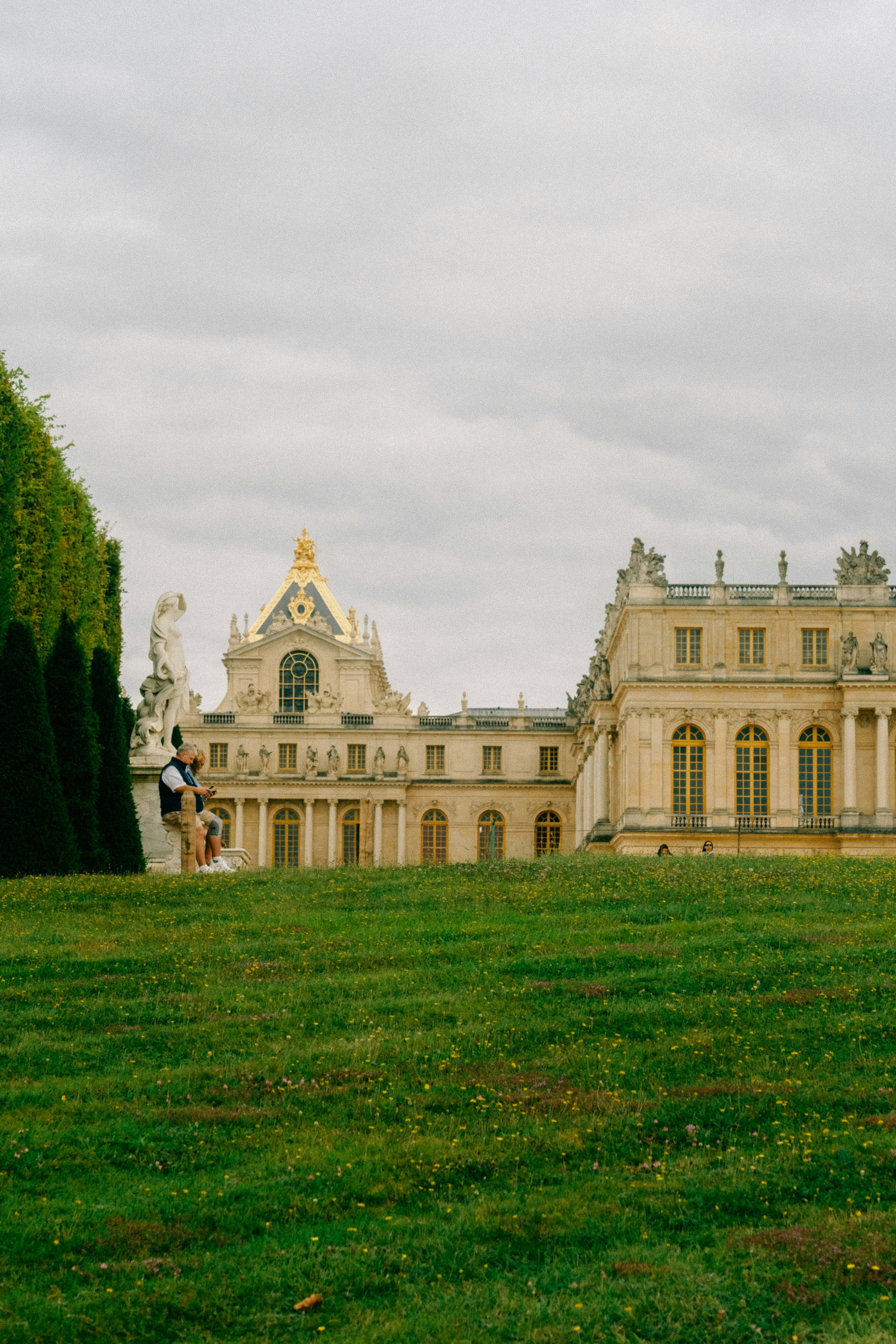 Gilded Rooflines Over a Quiet Palace Forecourt
