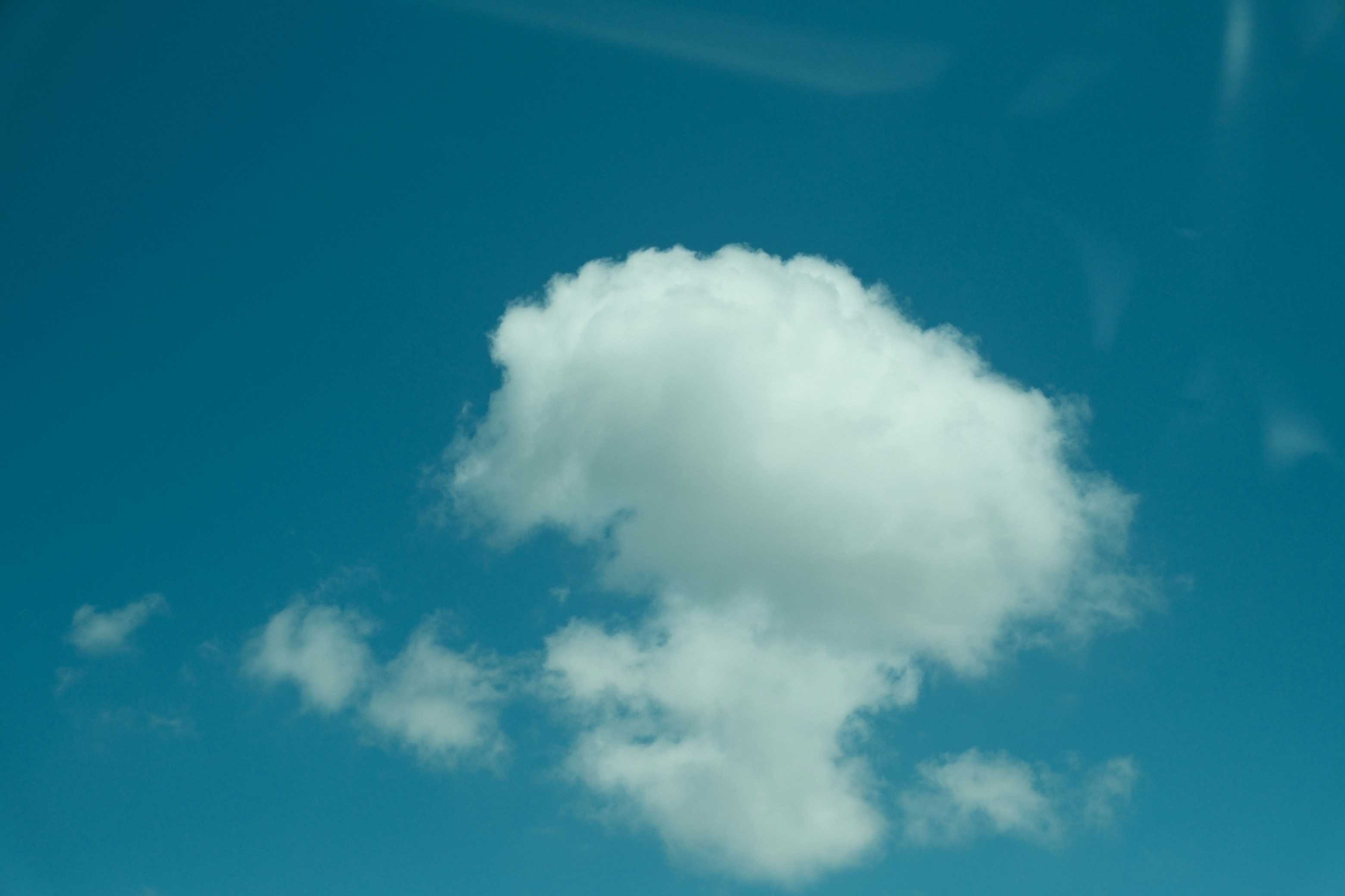 Cerulean Sky with a Lone Cloud: A Minimal Skyscape