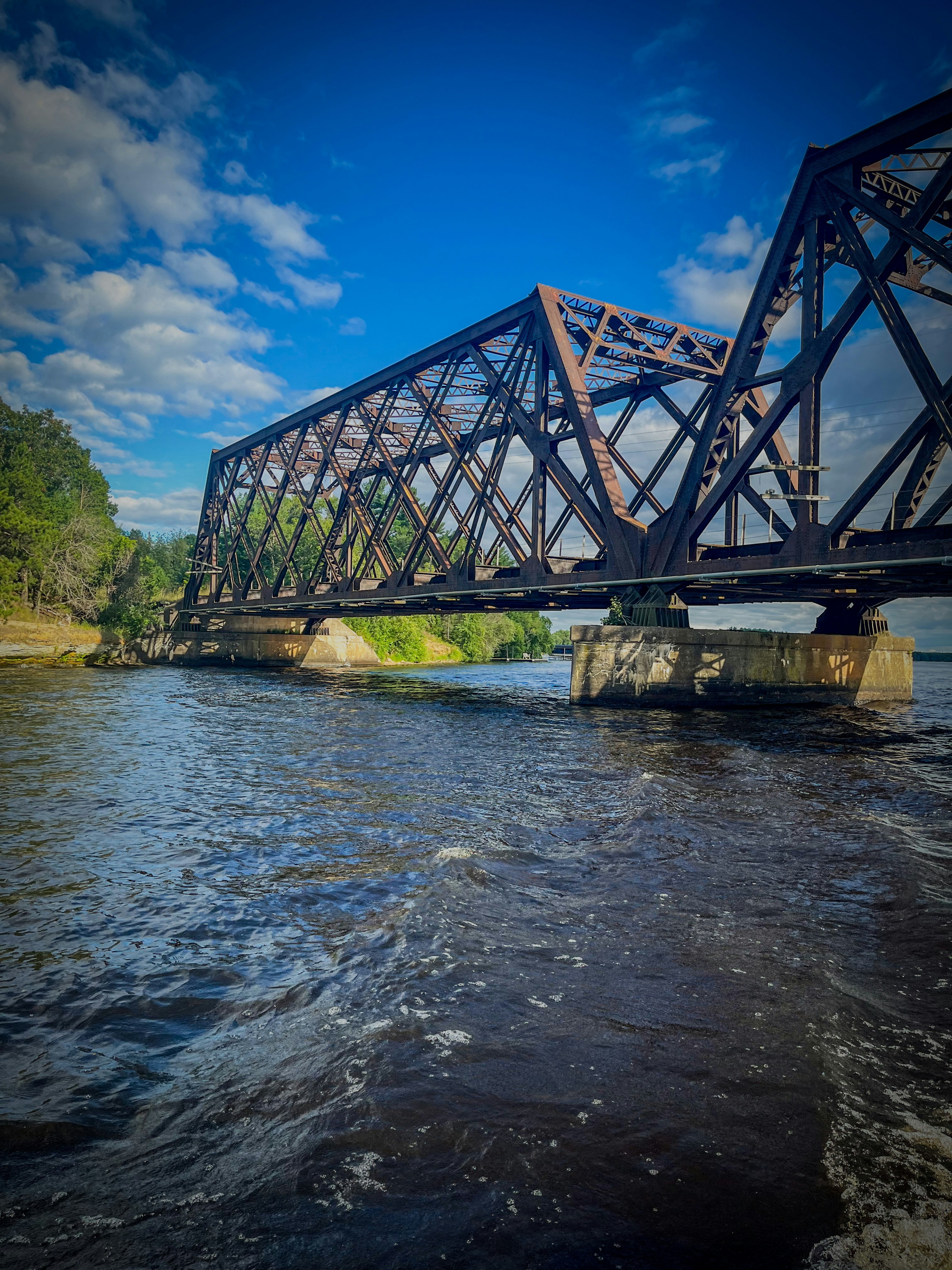 A train bridge over a body of water photo – Free Castle rock lake Image ...
