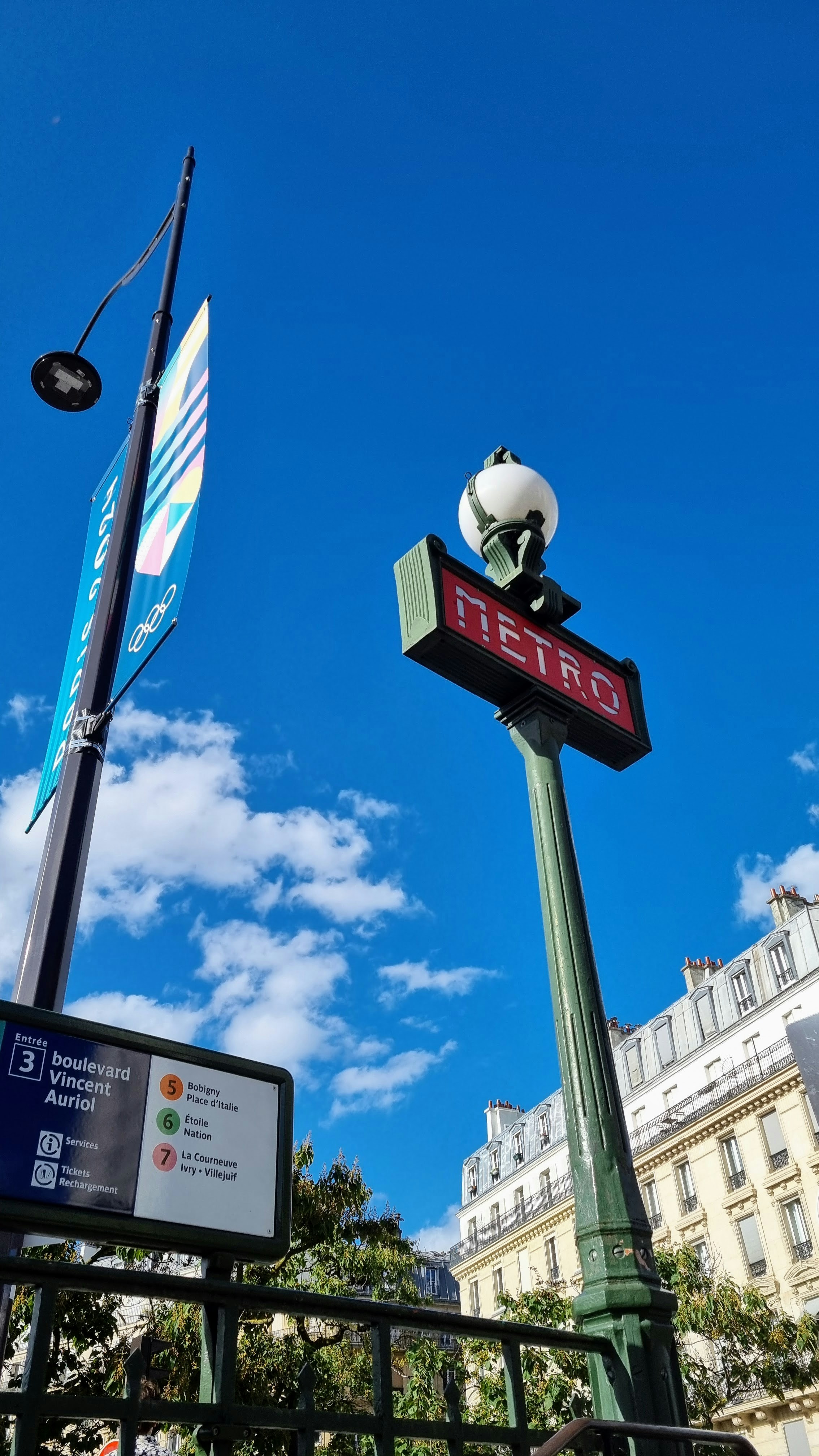 Metro Sign Against a Sapphire Sky: A Parisian Street Portrait