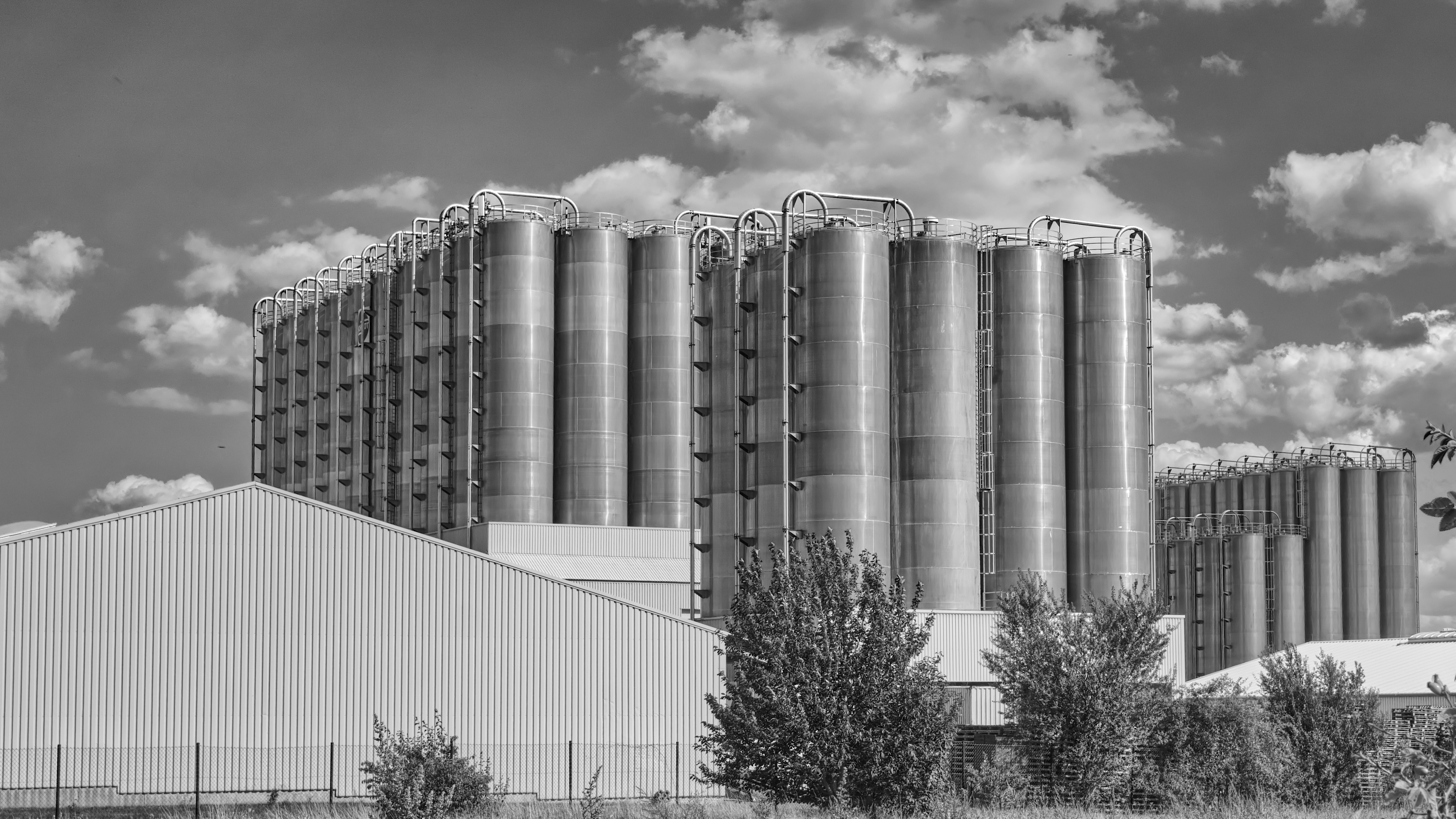 Industrial Silhouette Under Dramatic Skies