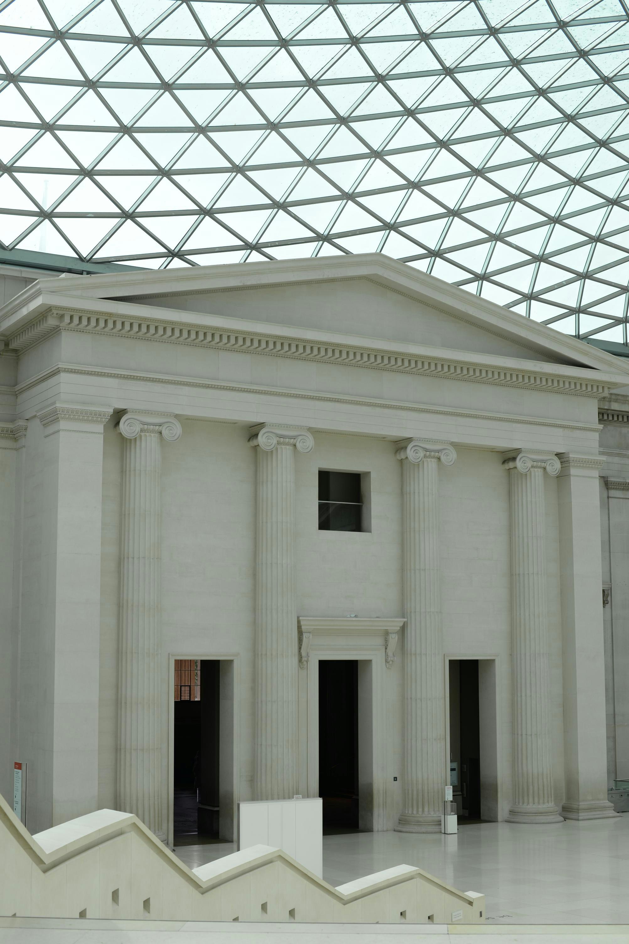 Colonnade Beneath a Glass Dome: Quiet Grandeur in a Neoclassical Hall