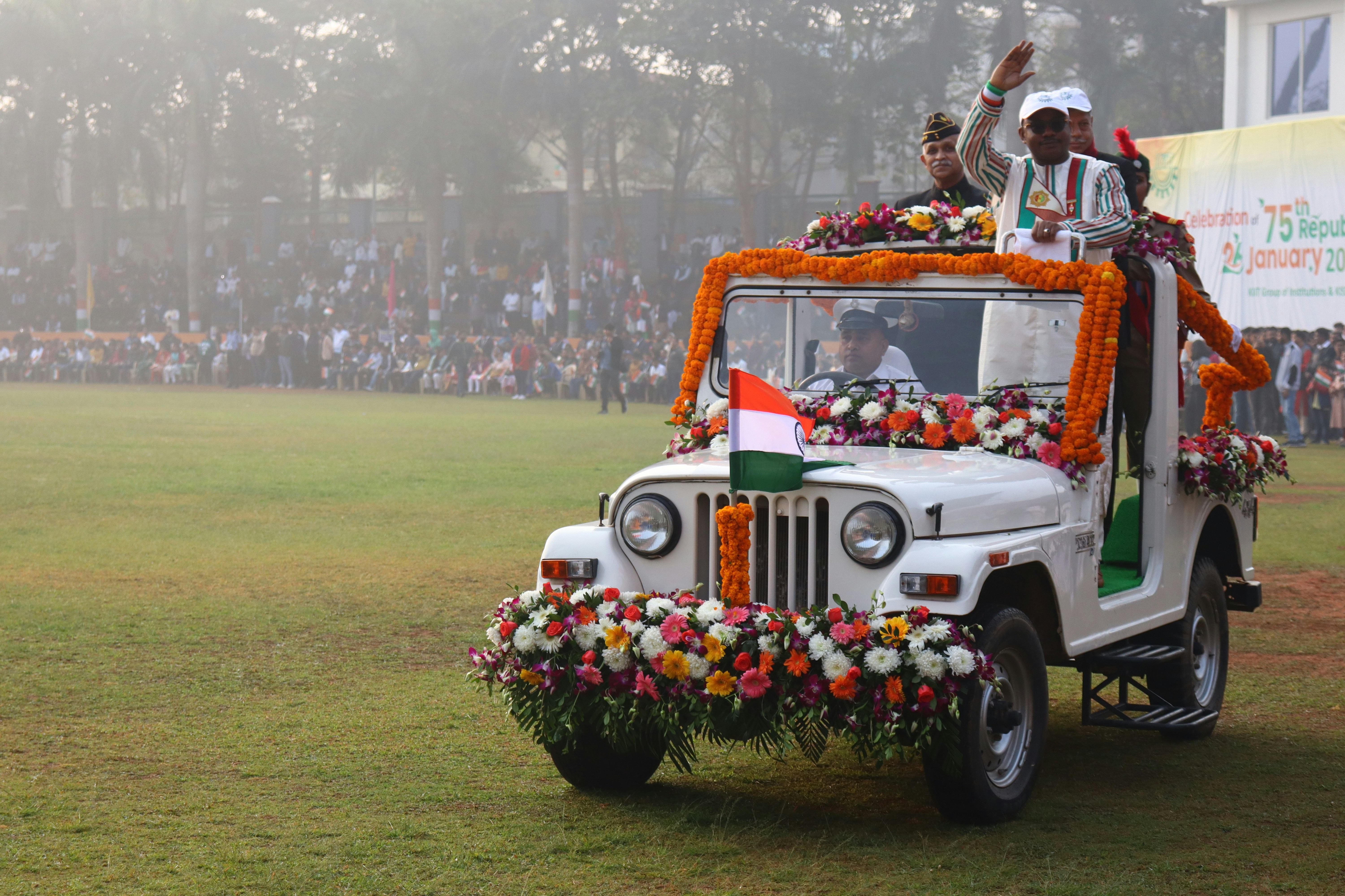 A jeep is decorated with flowers and flags photo – Free Kiit road Image ...