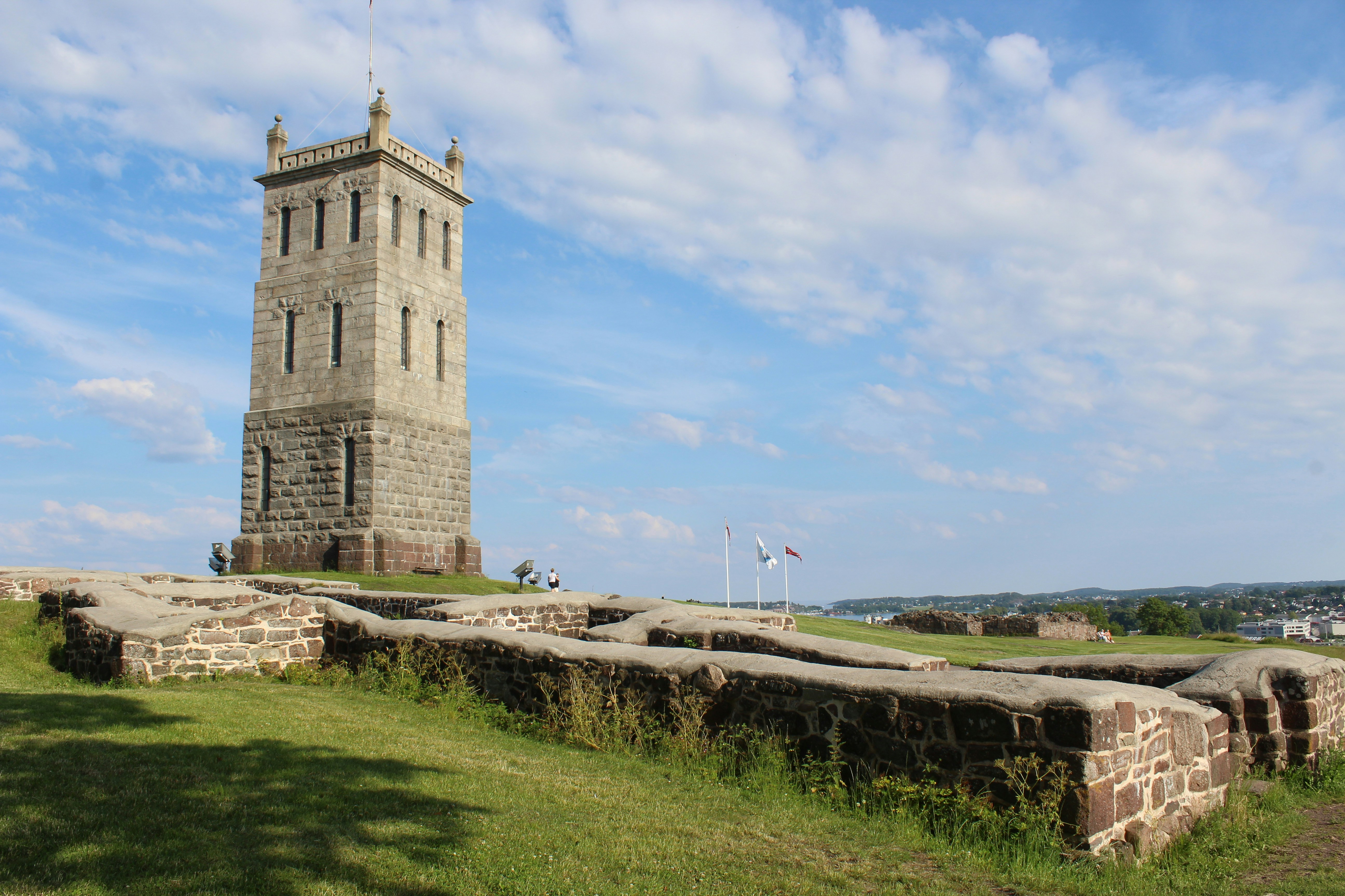 Lone Coastal Bastion: Stone Tower Above Weathered Ramparts
