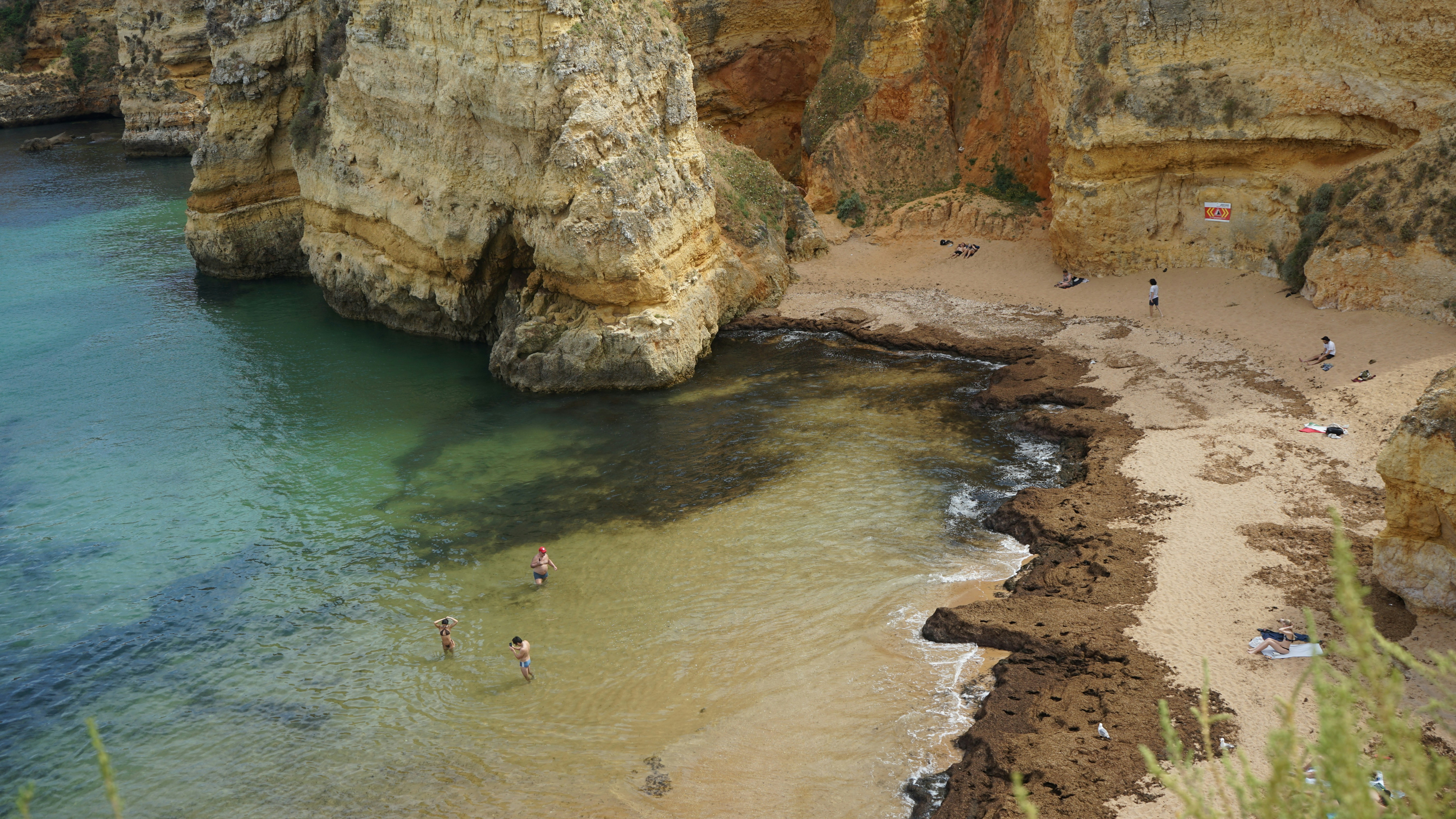 Serene Cove Embraced by Majestic Cliffs
