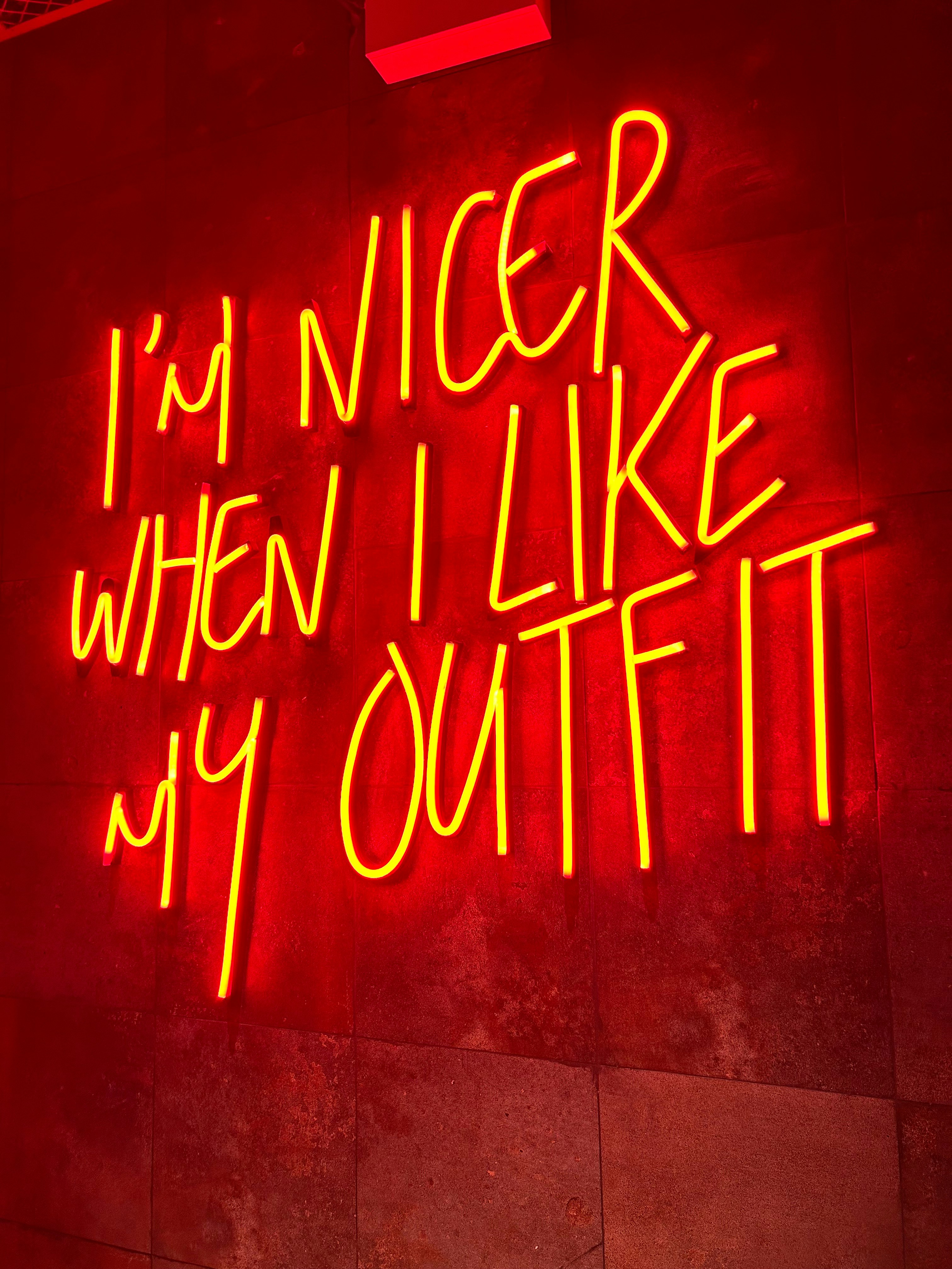 A neon sign that says i'm nicer when i like my outfit photo – Free ...