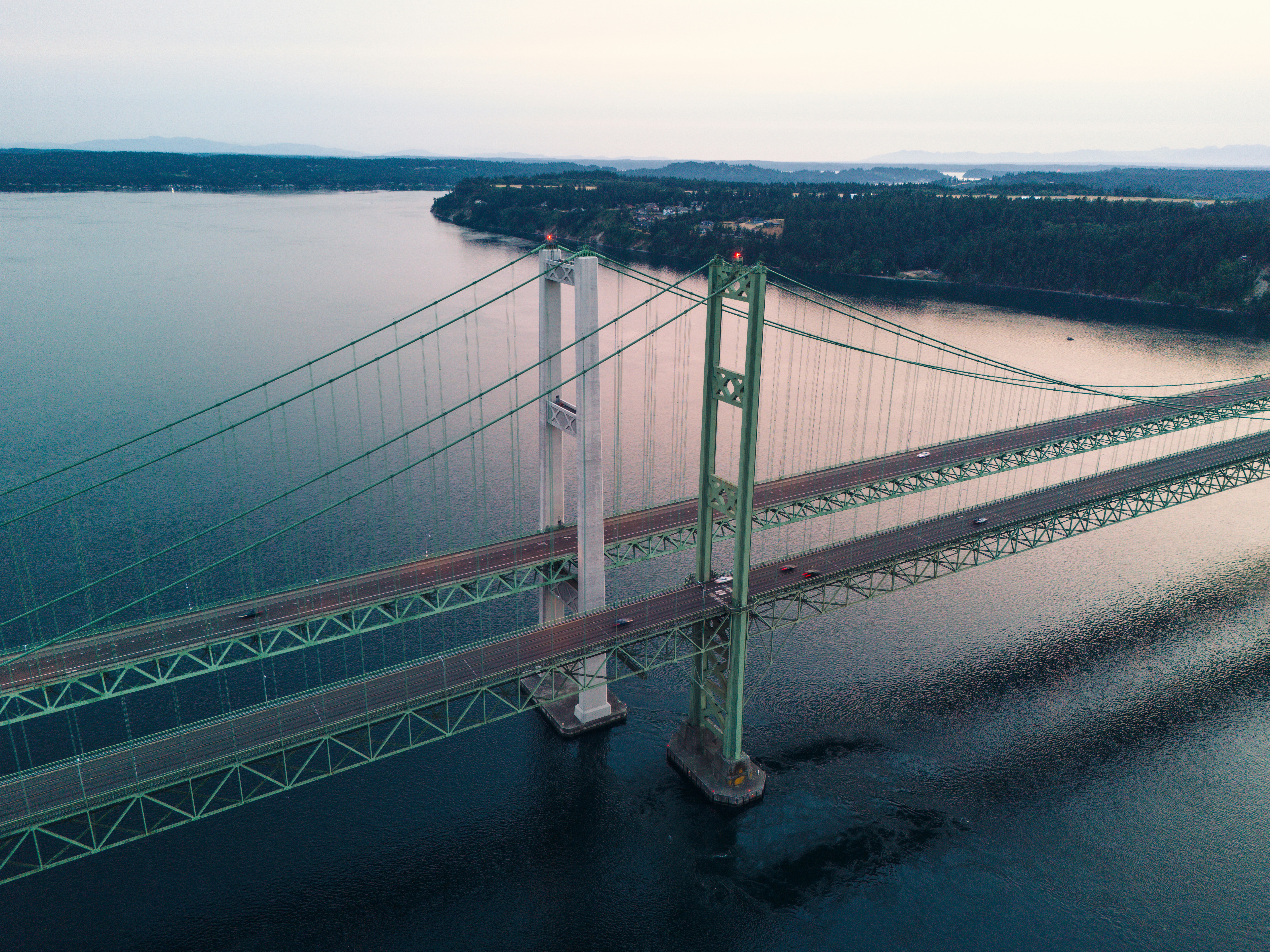 High-Span Quiet: Aerial View of the Suspension Bridge Over a Narrow Waterway