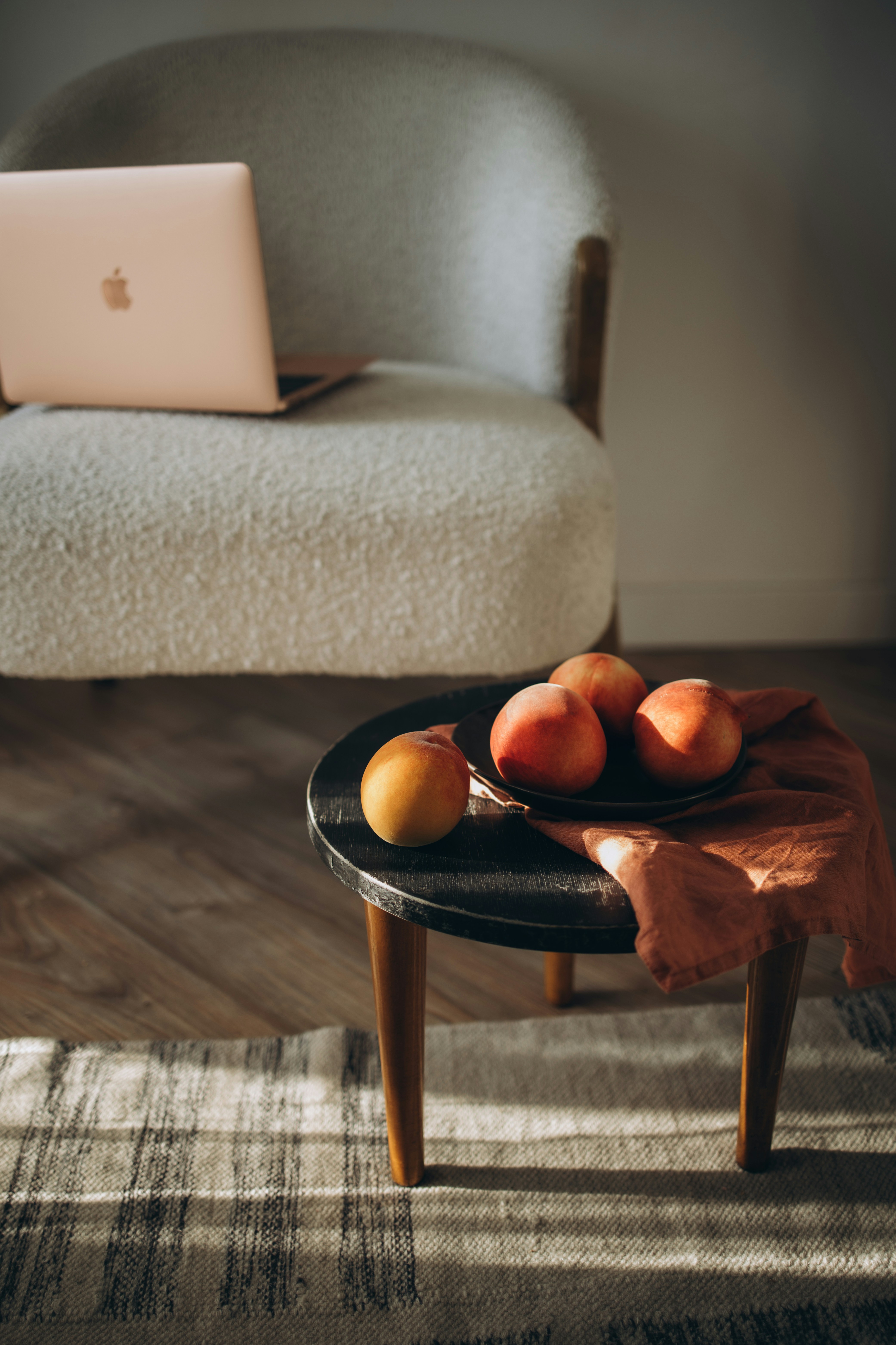 Fruit Still Life at Dusk: A Laptop Waits Nearby